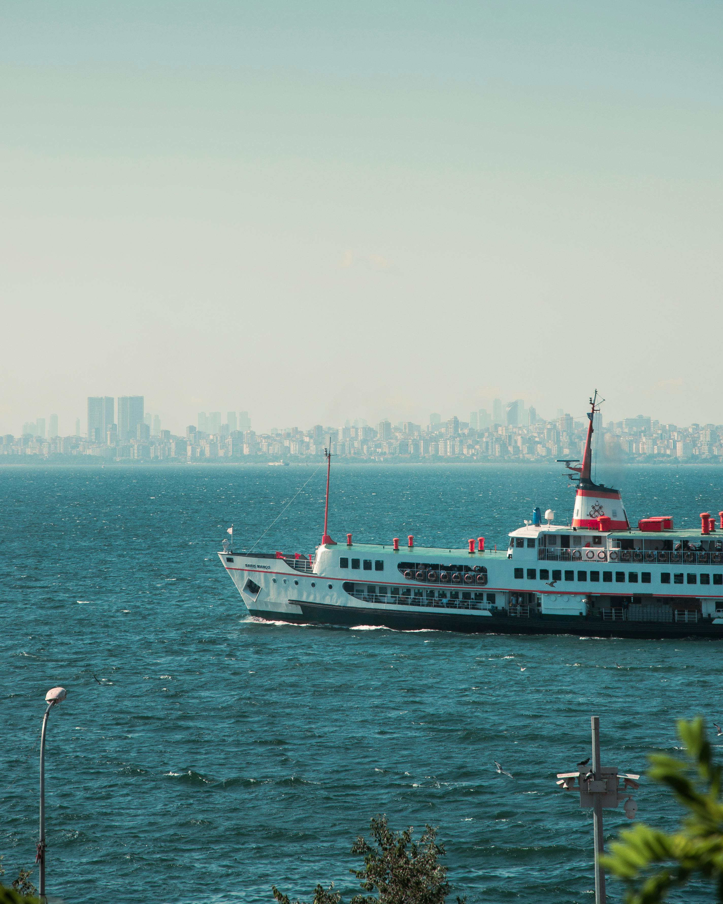 White and Red Ship on Sea · Free Stock Photo