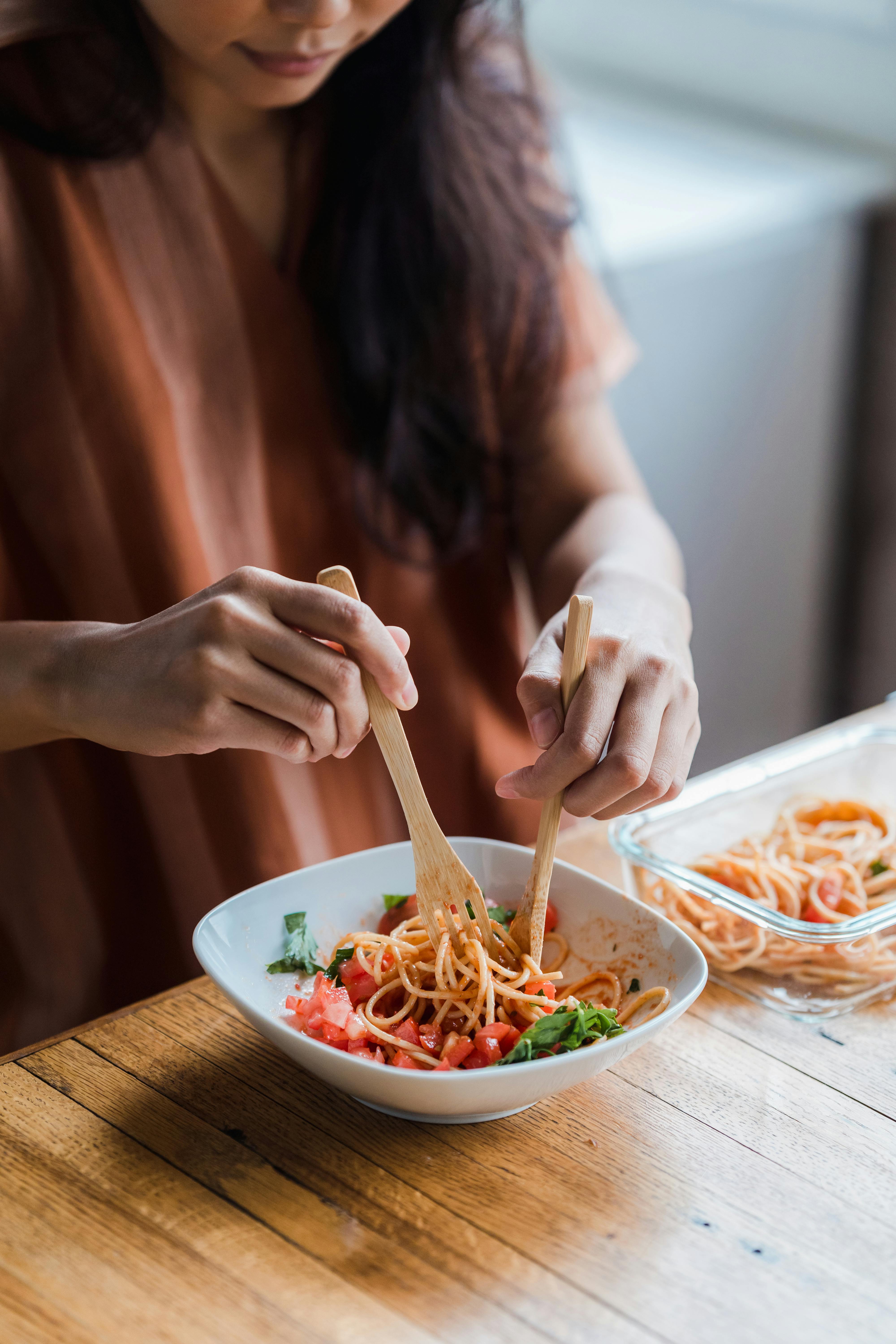 A Woman Eating a Delicious Spaghetti · Free Stock Photo