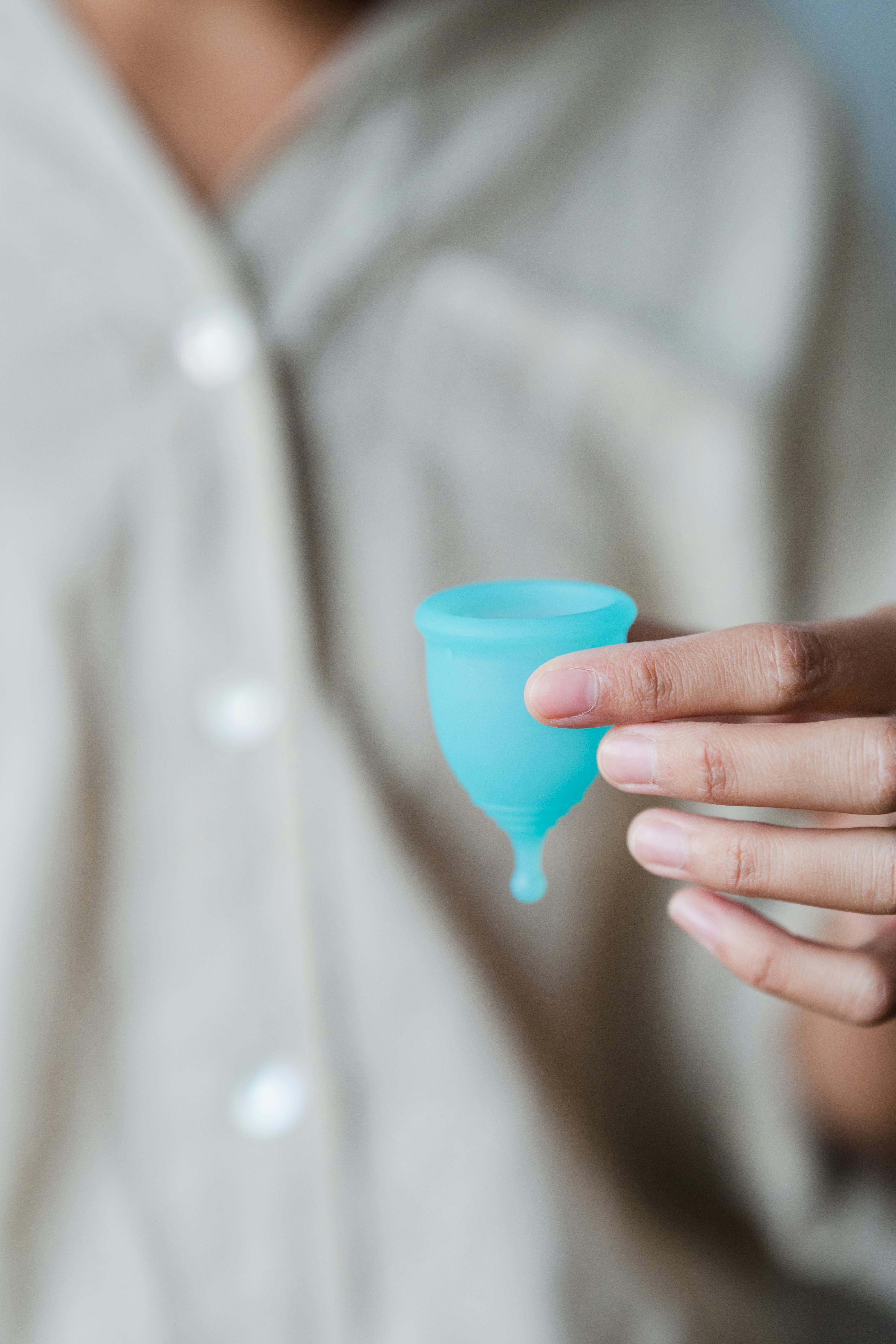 Close-Up Photo of Person Holding a Menstrual Cup · Free Stock Photo
