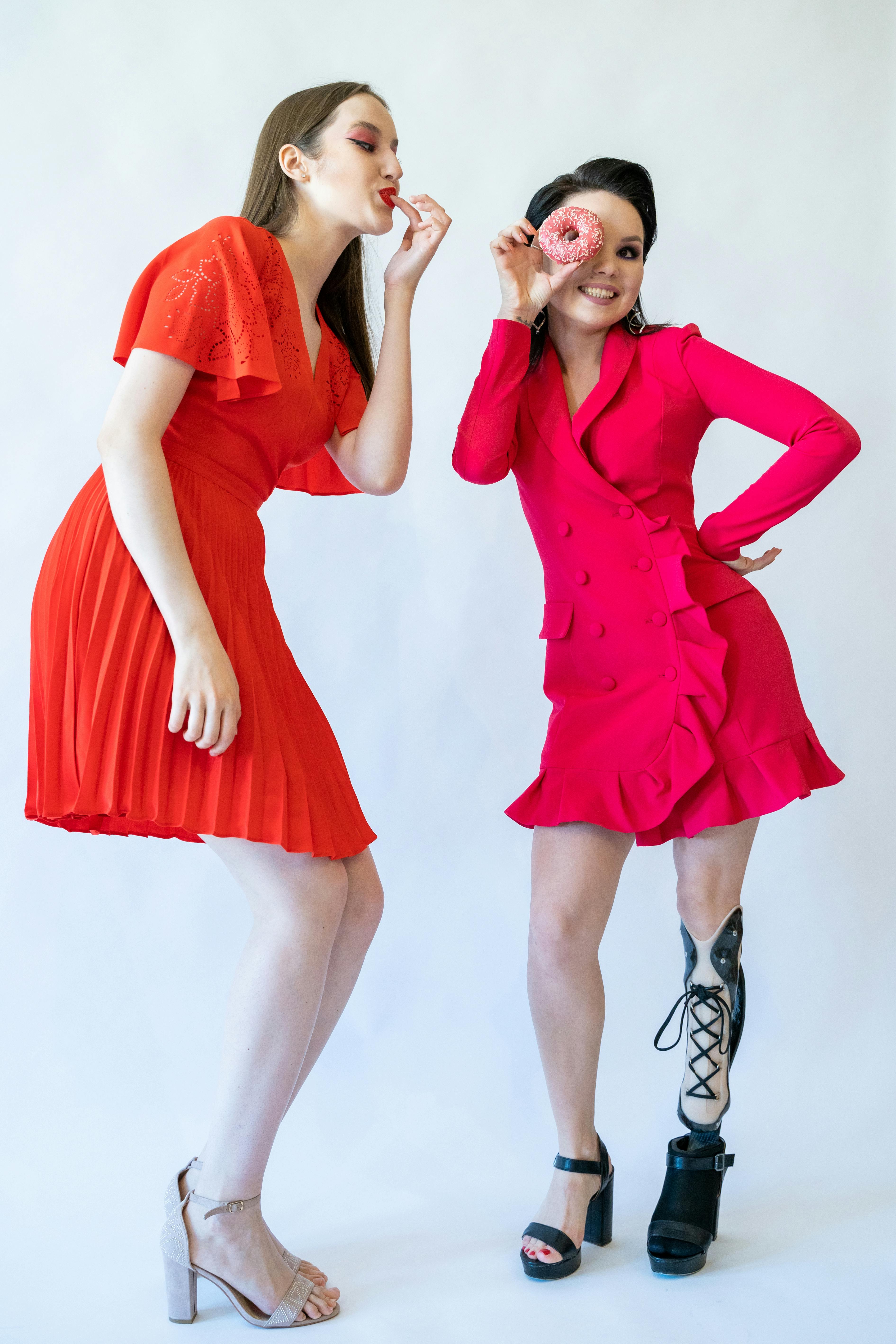 A Two Women Wearing Red Dress · Free Stock Photo