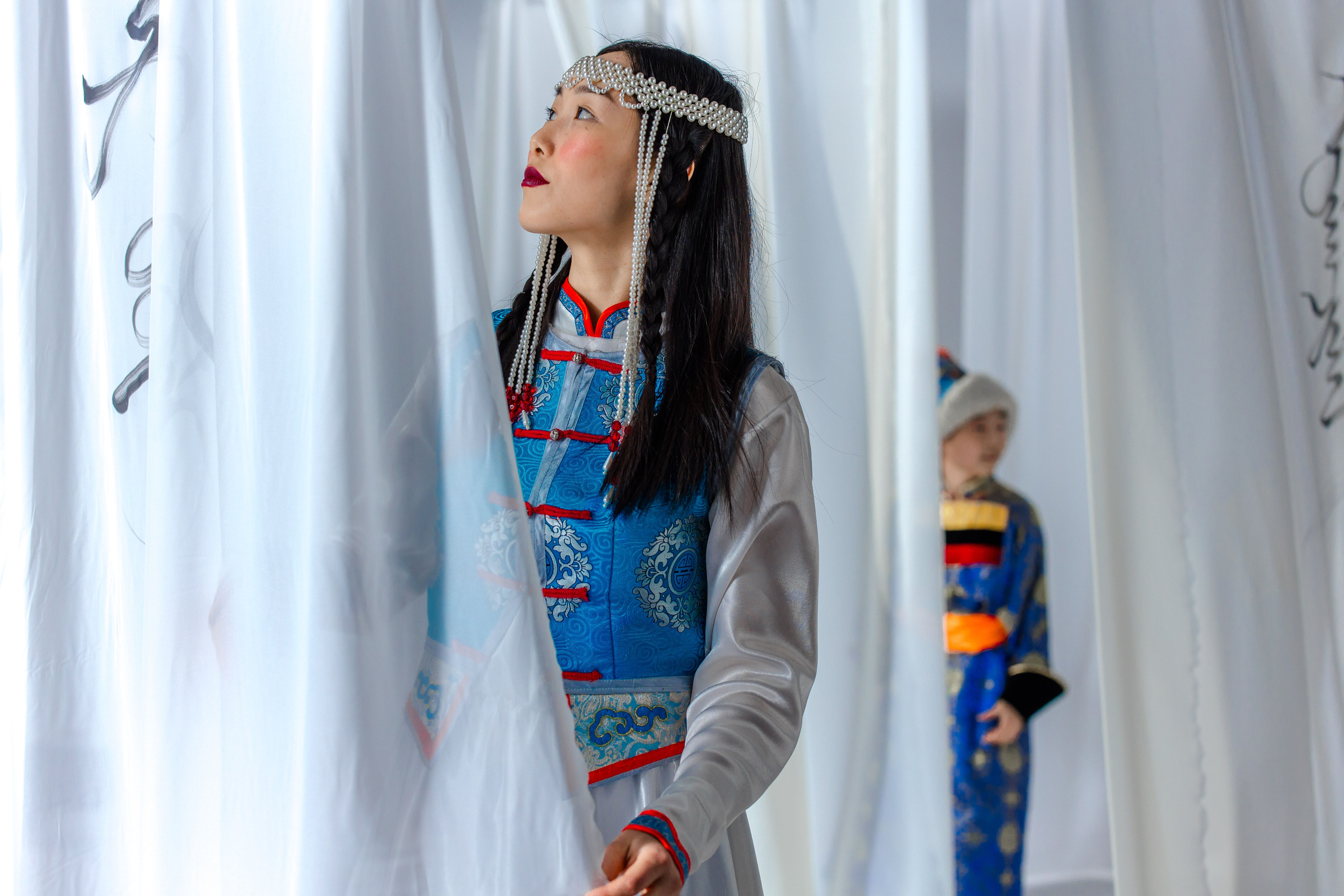 Children in Traditional Mongolian Clothing behind a Curtain · Free ...