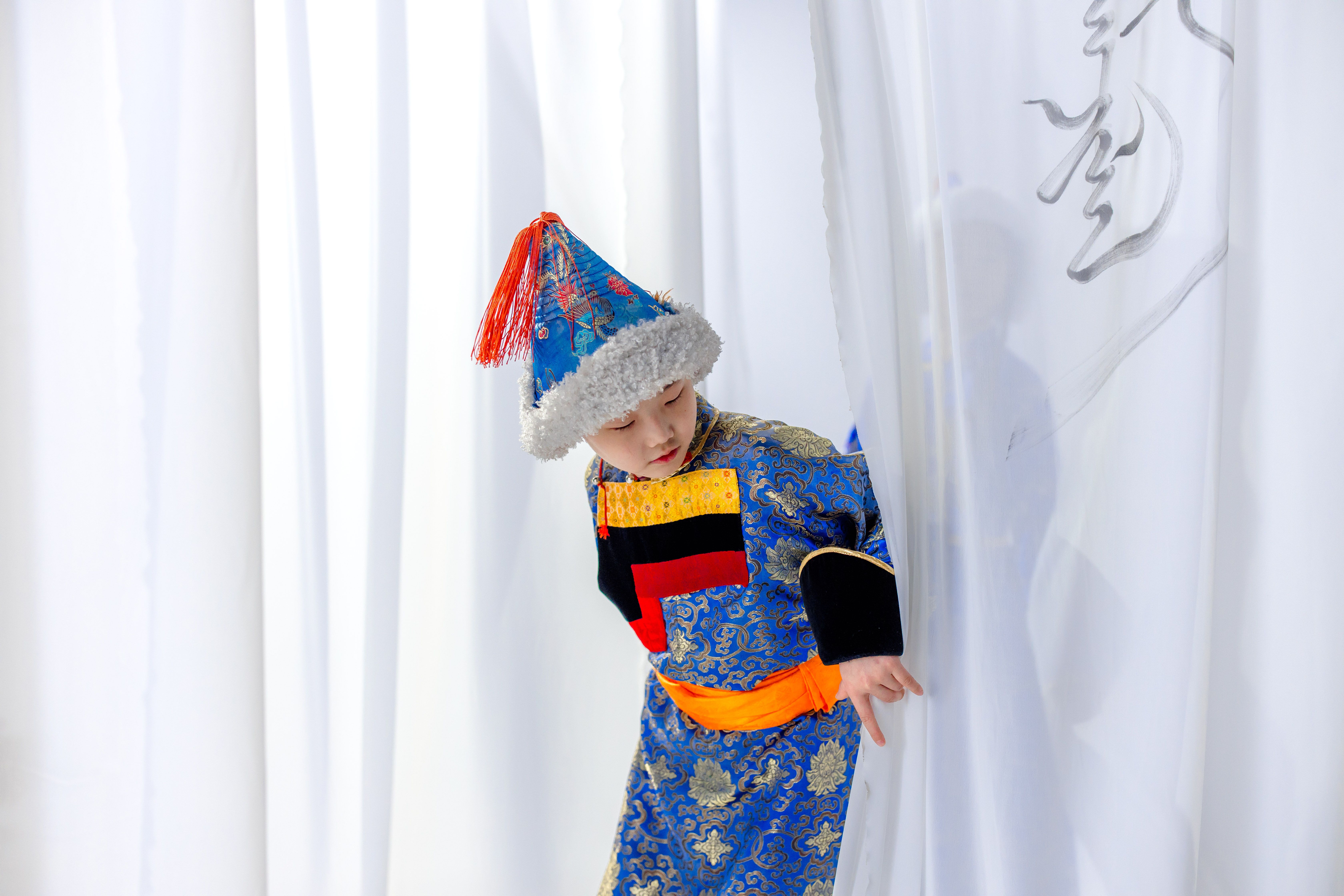 Children in Traditional Mongolian Clothing behind a Curtain · Free ...