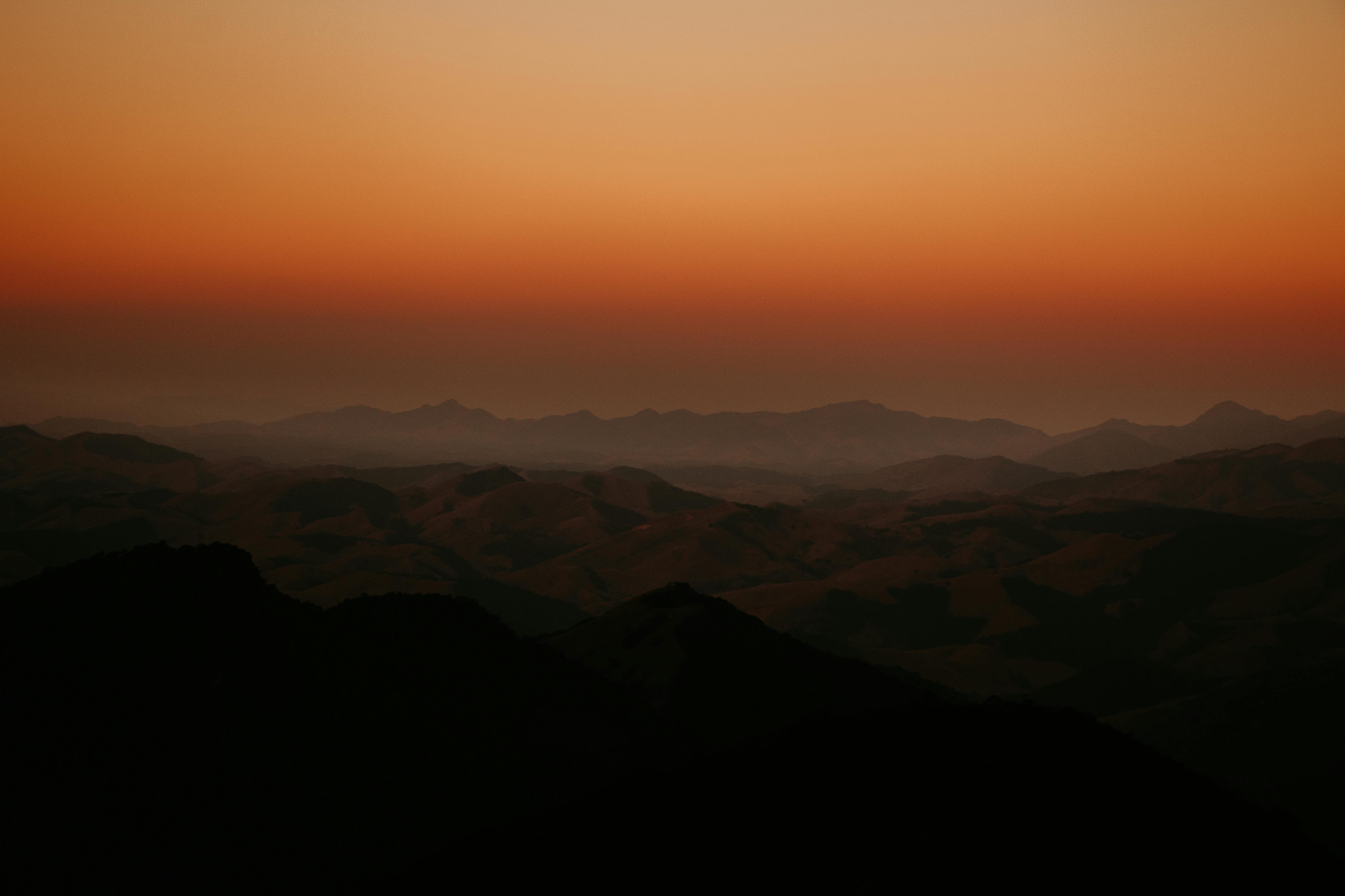 Red Sky and Sun over City at Sunset · Free Stock Photo