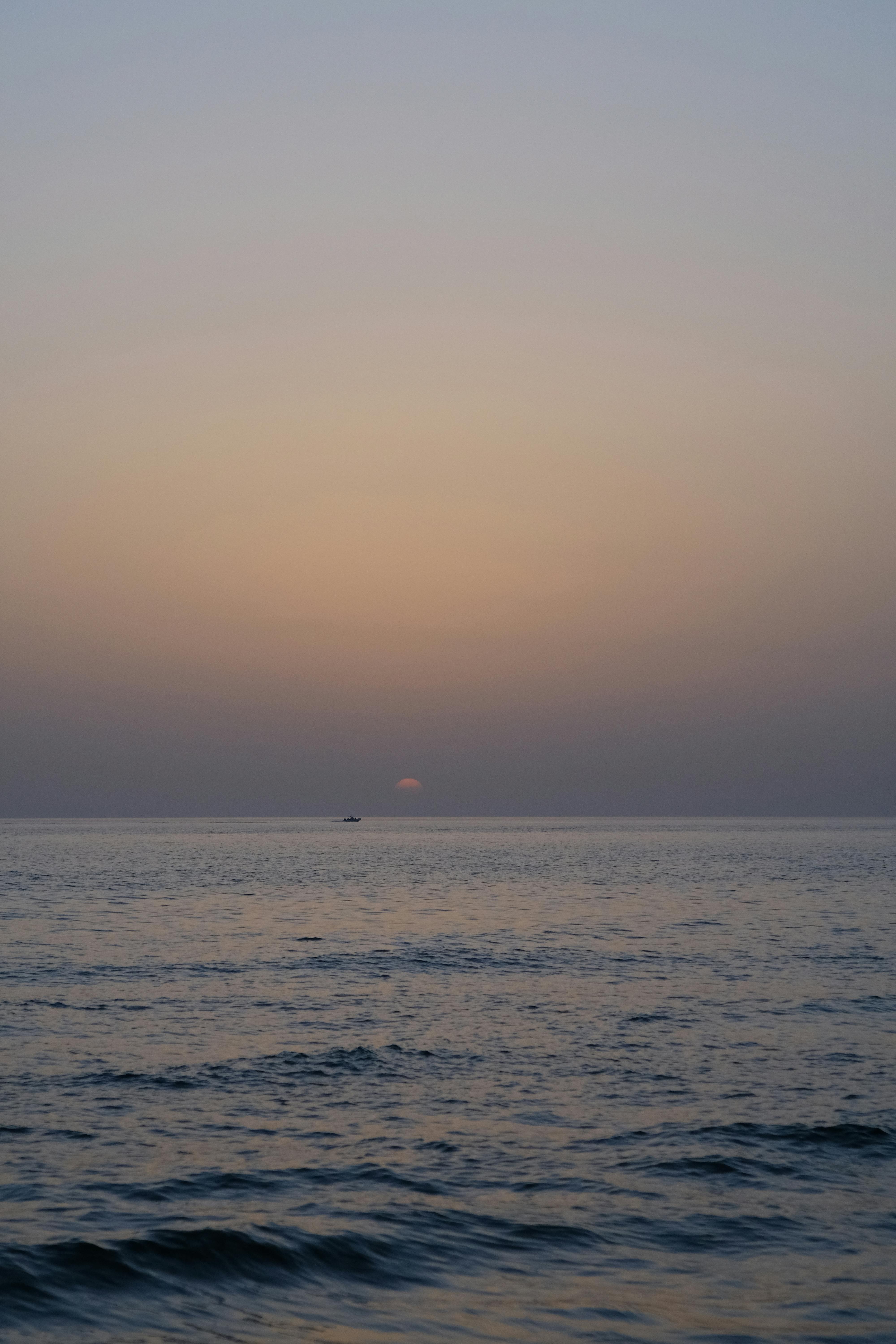 View of a Sea at Dusk · Free Stock Photo