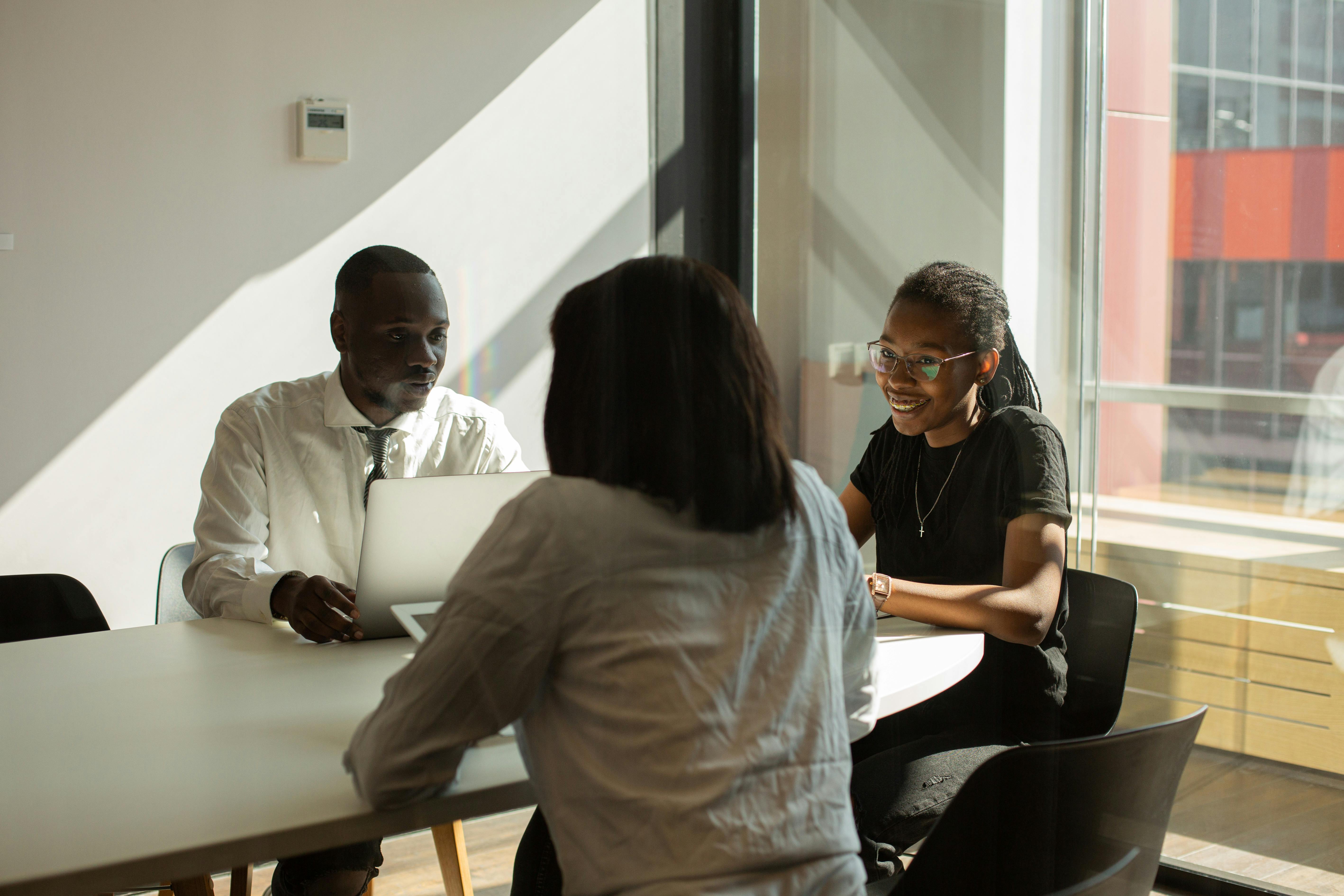 Coworkers having a Huddle · Free Stock Photo