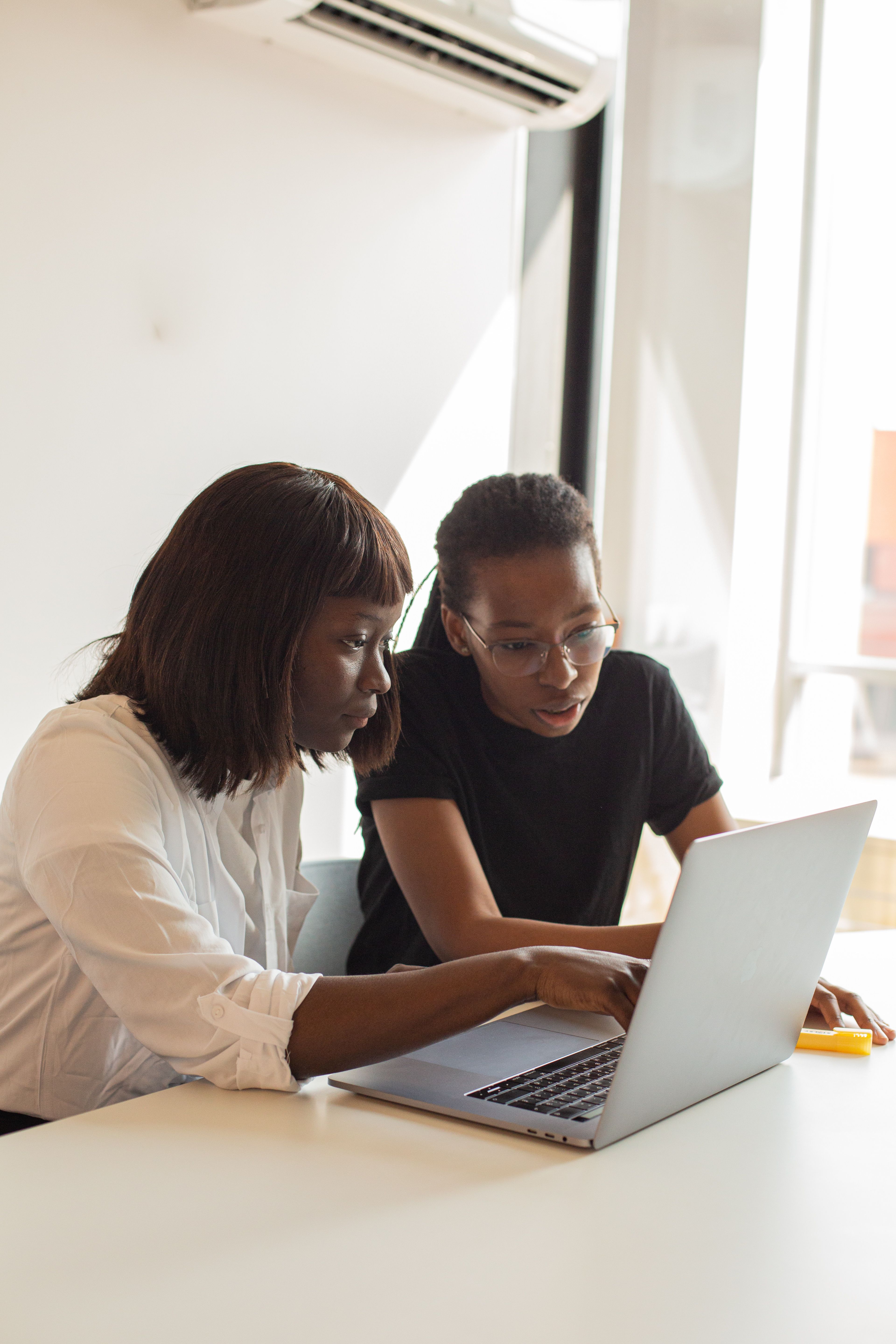Workmates in a Team Huddle · Free Stock Photo