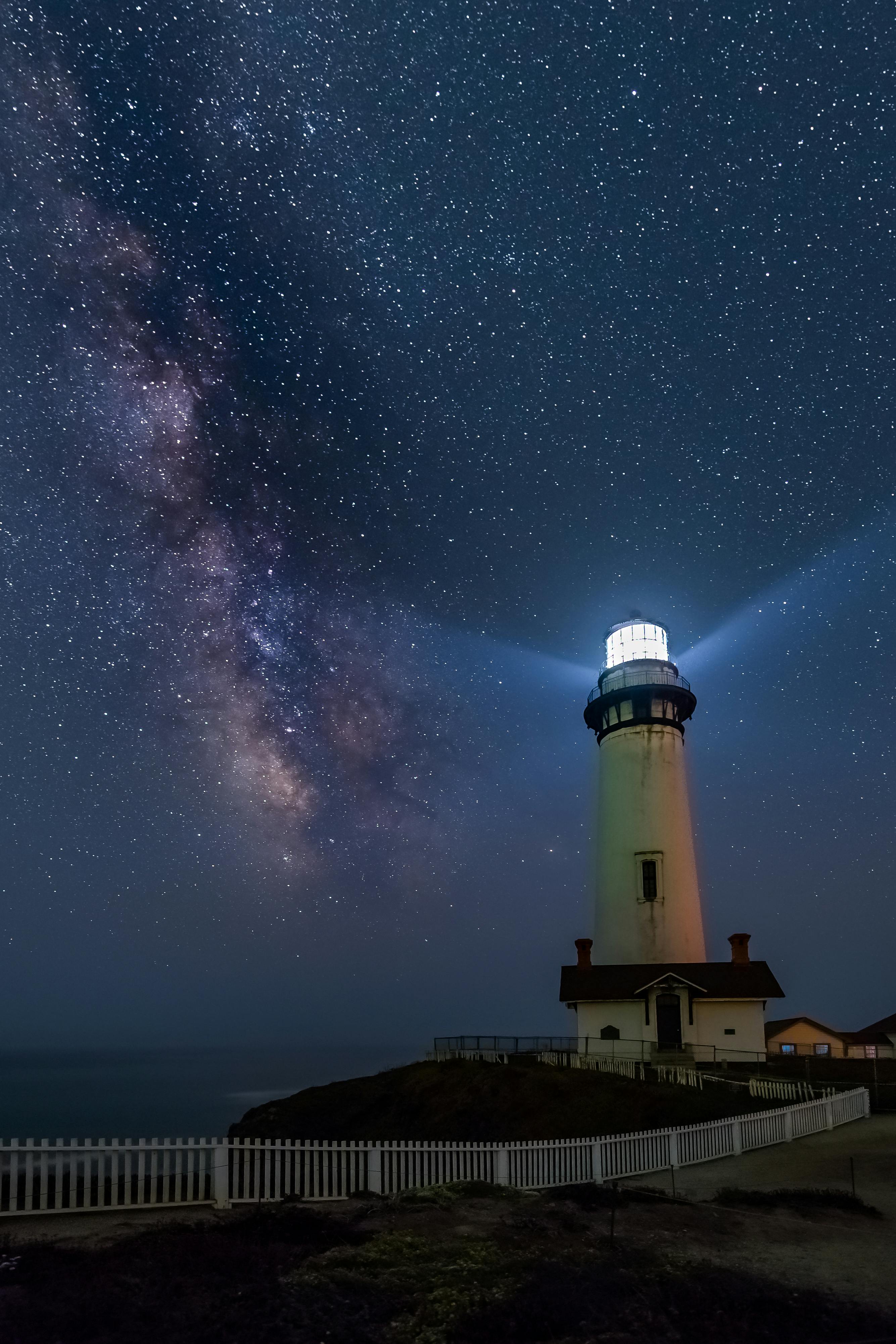 Lighthouse Tower Under Starry Night · Free Stock Photo