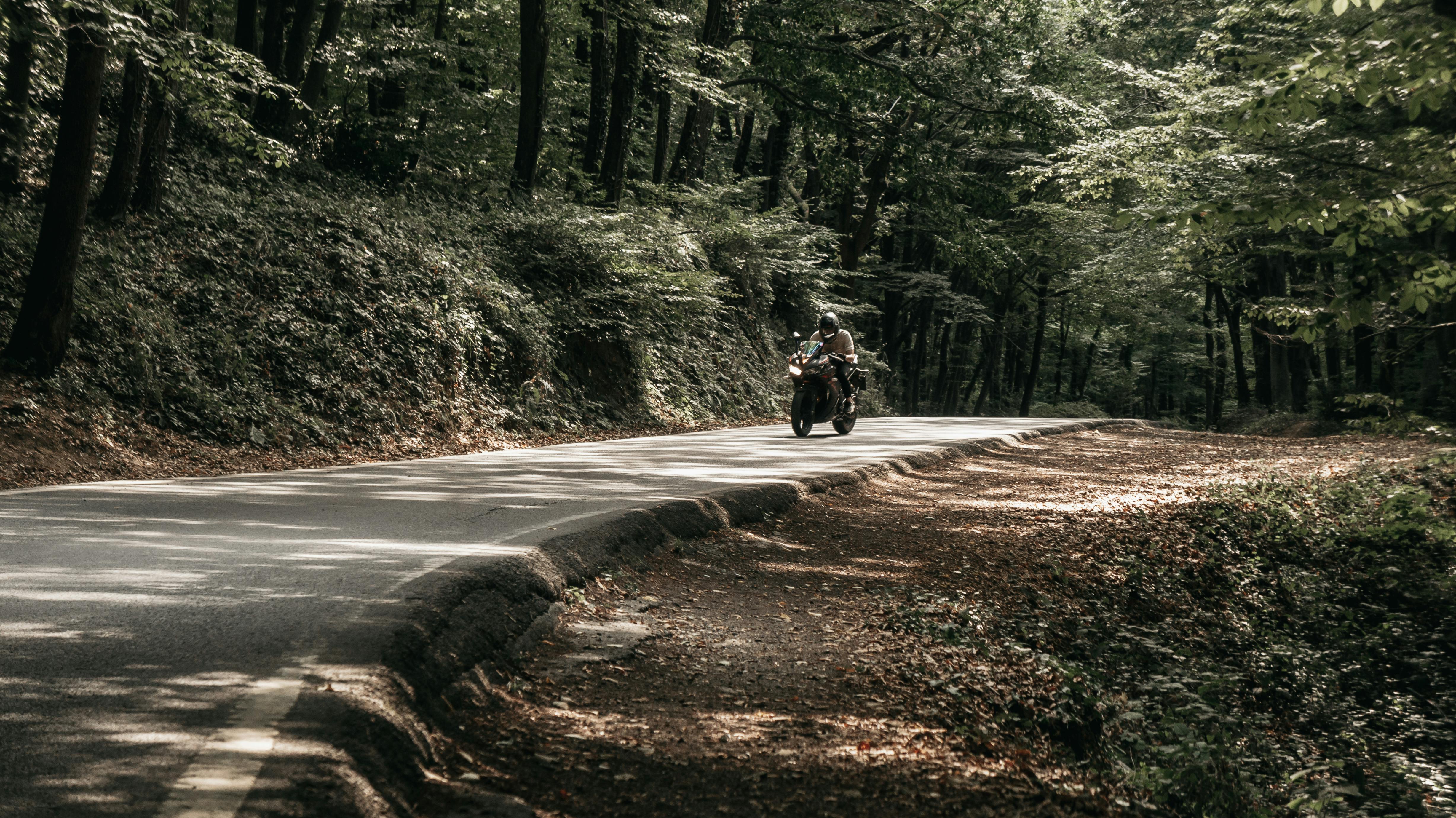 Woman Riding Red Motor Scooter · Free Stock Photo