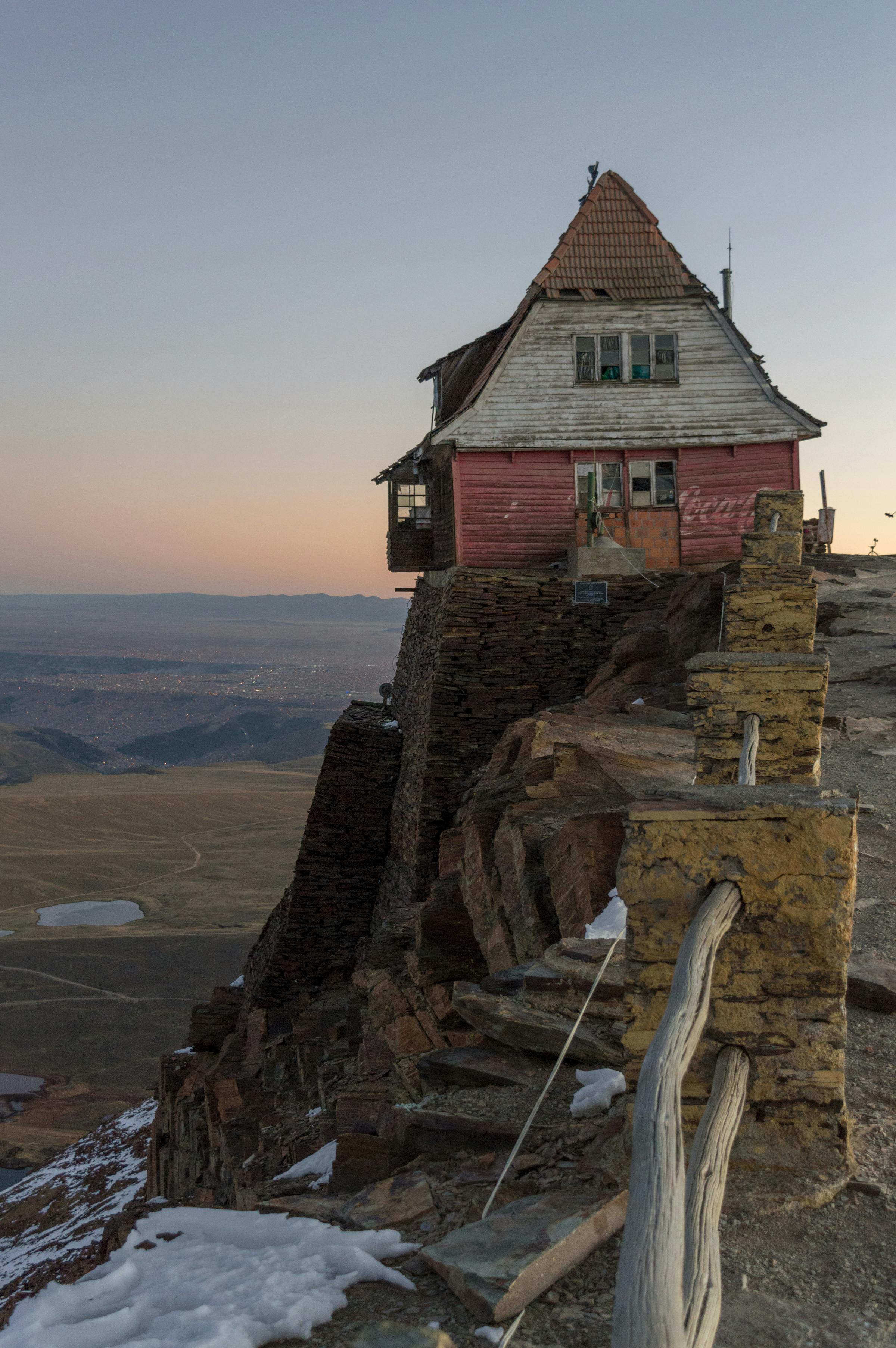 A Wooden House on Top of Rock Mountain · Free Stock Photo