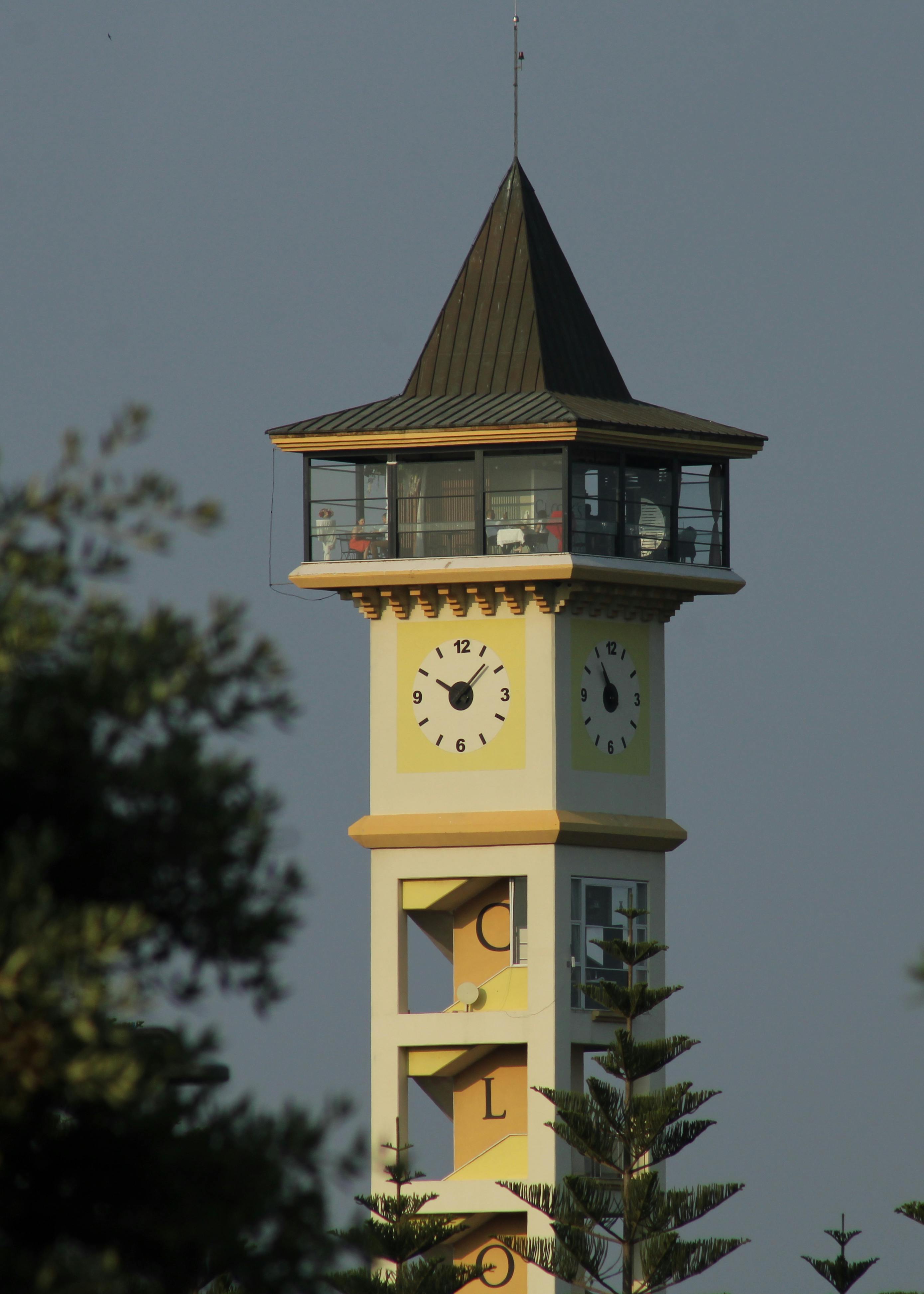 Photo of a White and Yellow Clock Tower · Free Stock Photo