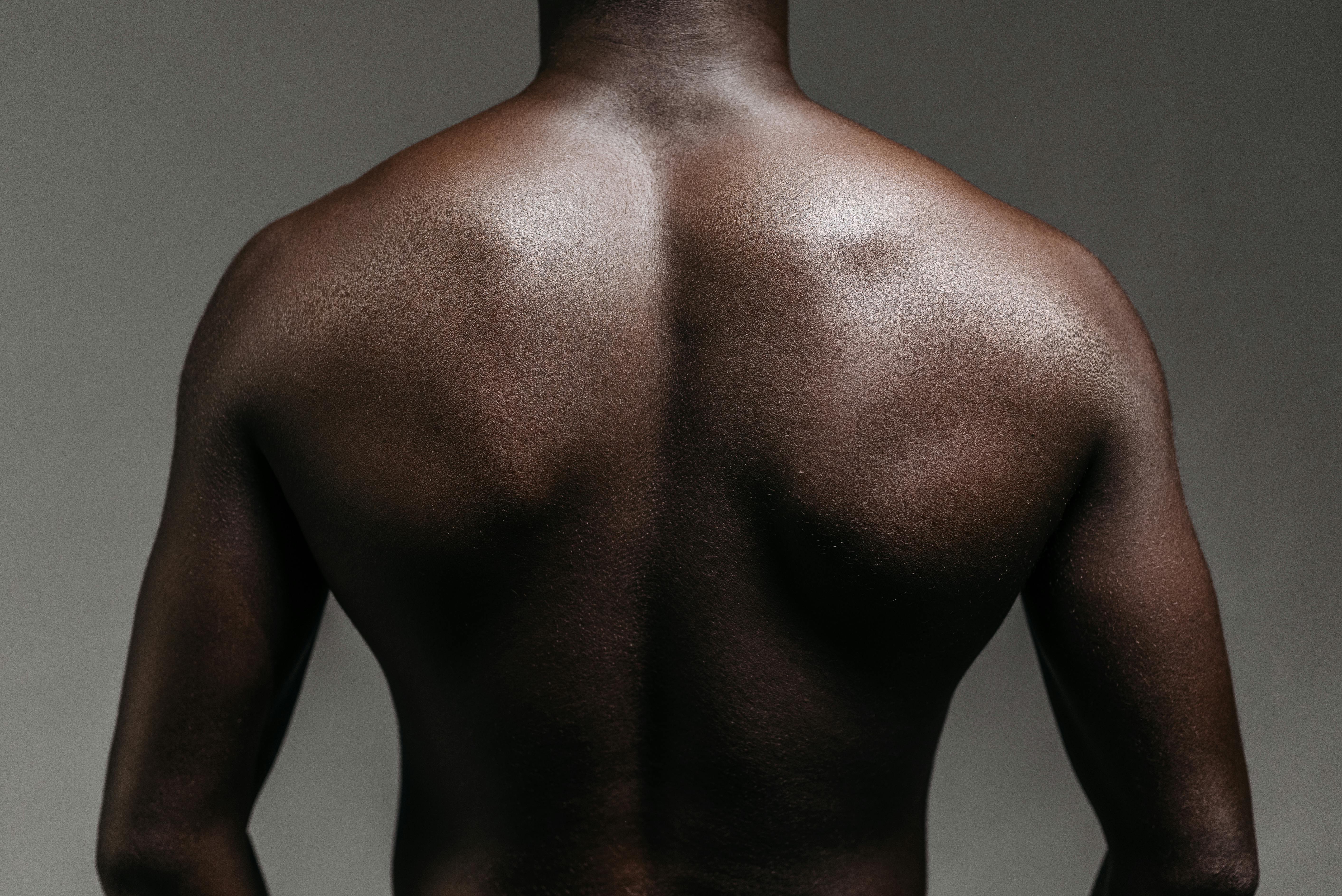 Back View Shot of a Topless Man · Free Stock Photo