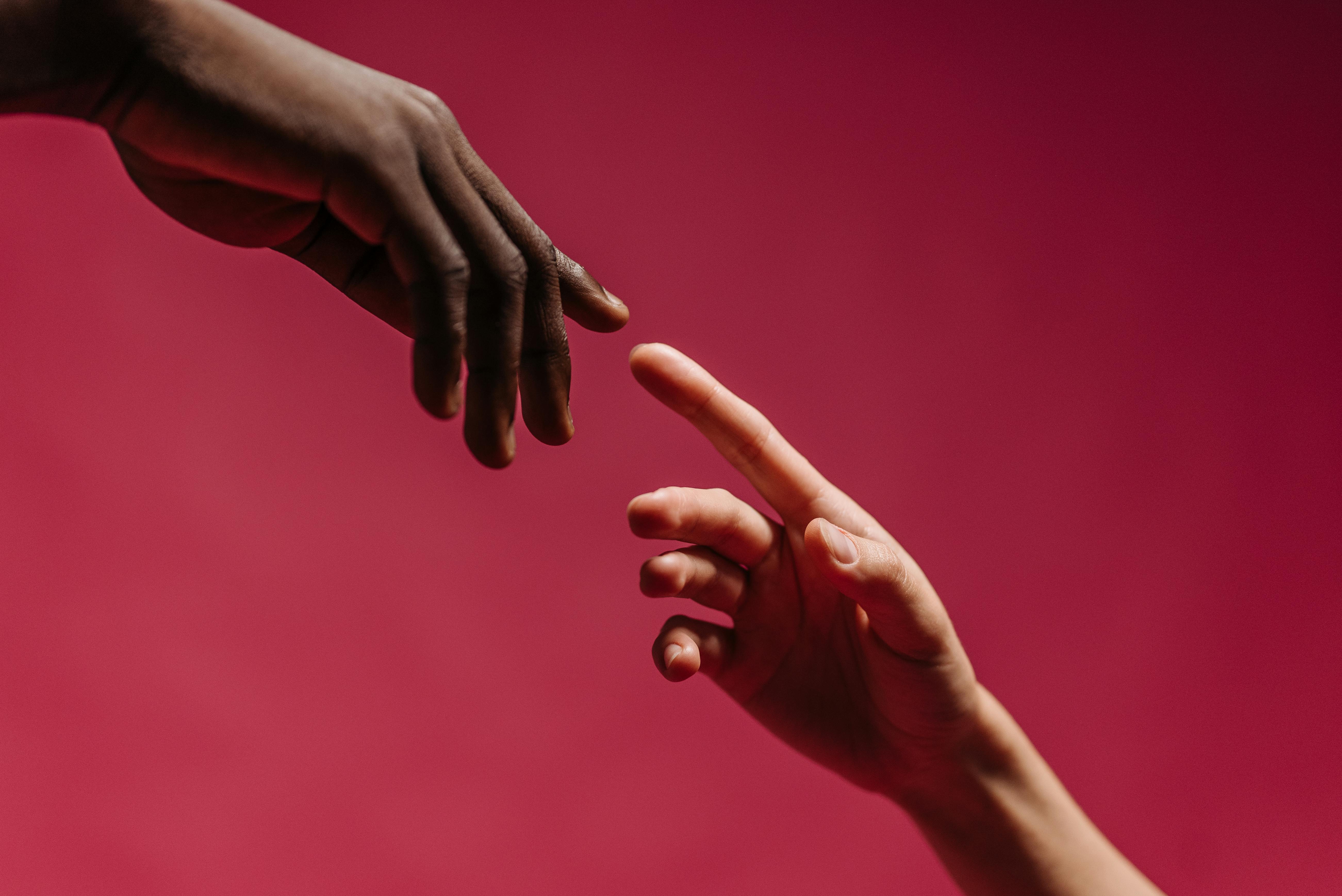 Close-up of Hand over White Background · Free Stock Photo