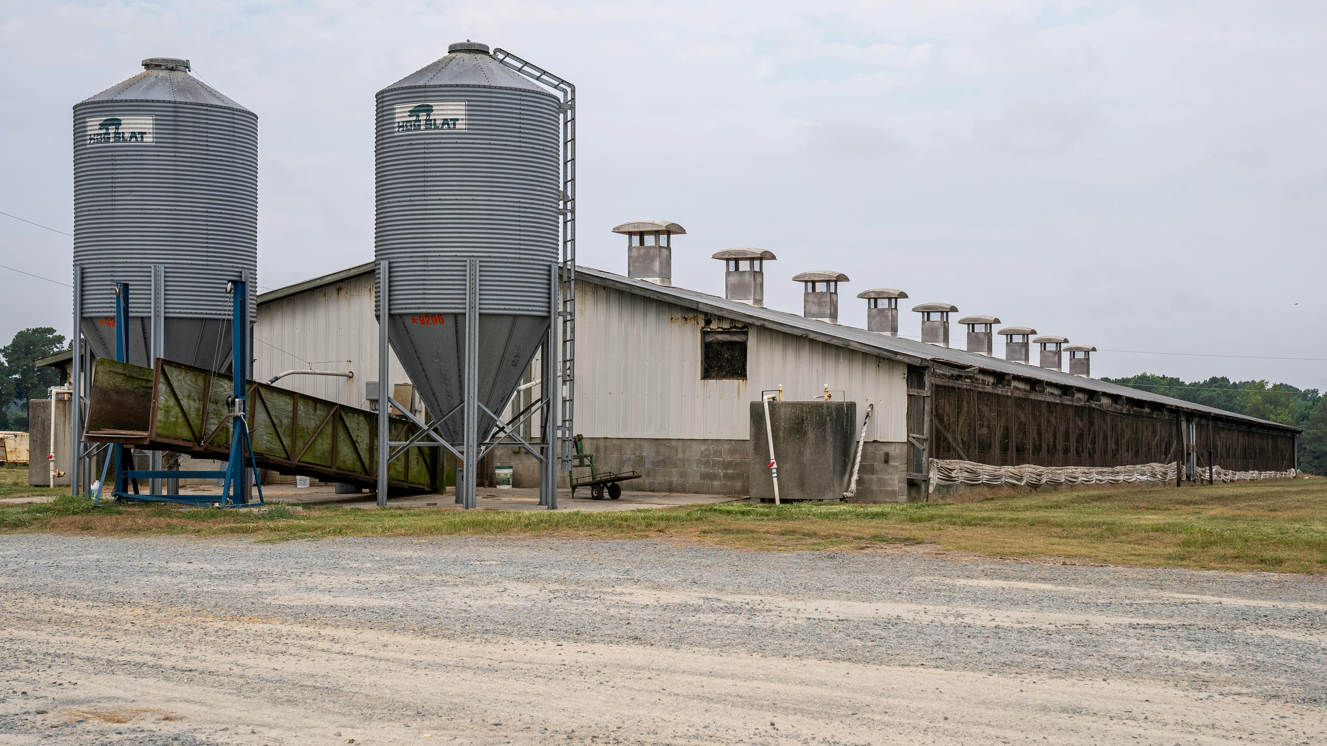 Large Building and Steel Containers on a Farm · Free Stock Photo