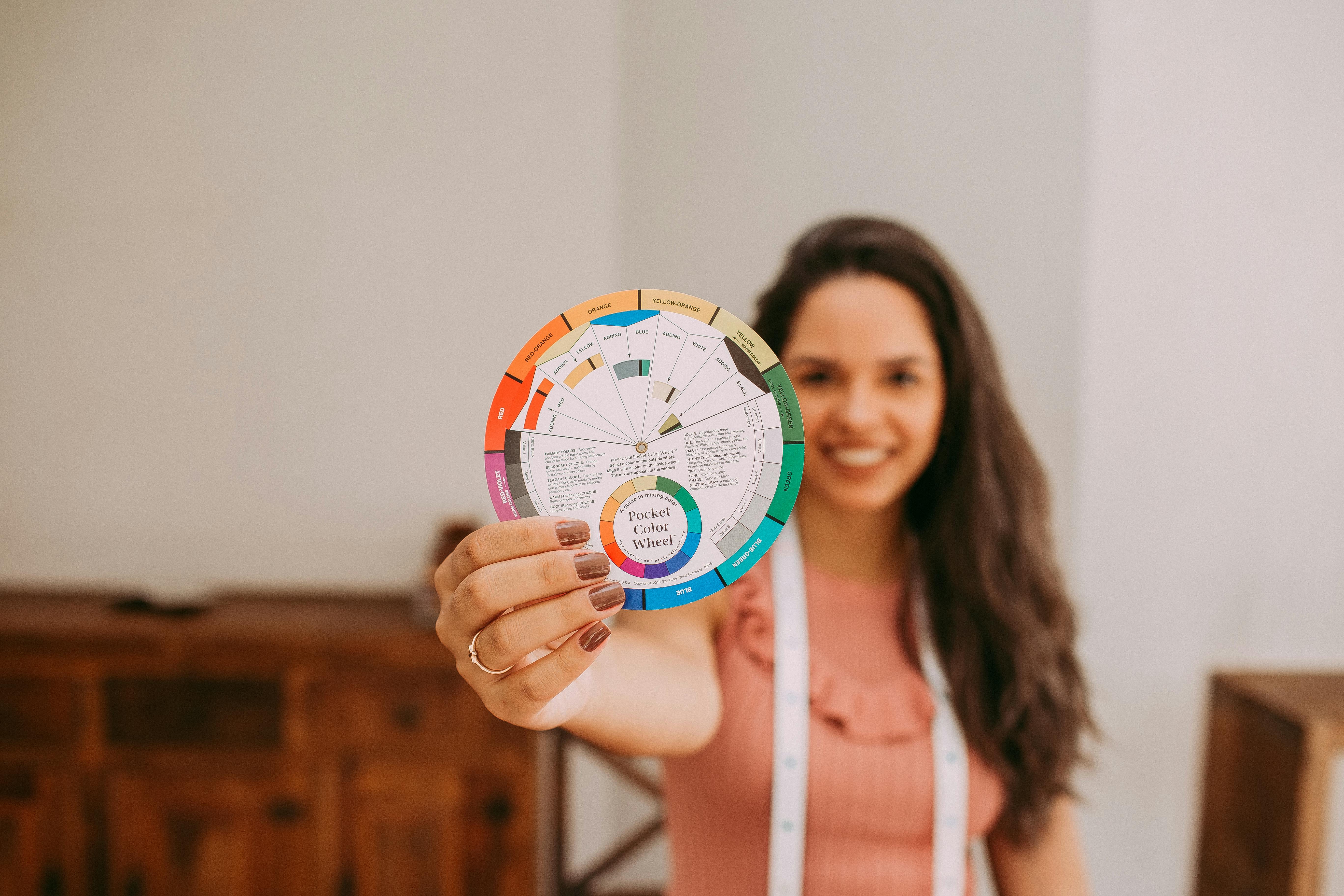 Woman Holding Color Wheel · Free Stock Photo