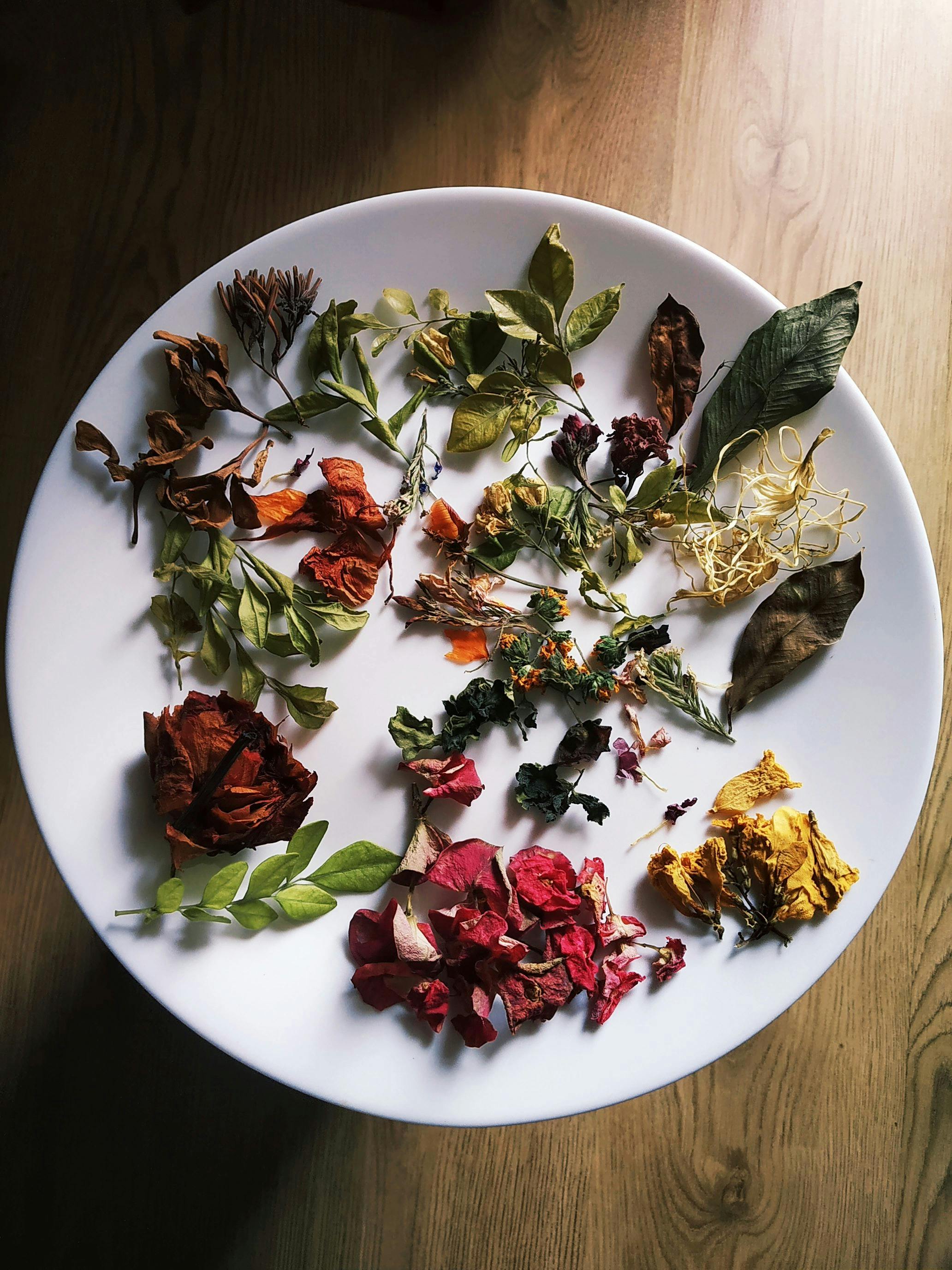 Mixture of Herbs and Dried Blossom in Ceramic Bowl · Free Stock Photo