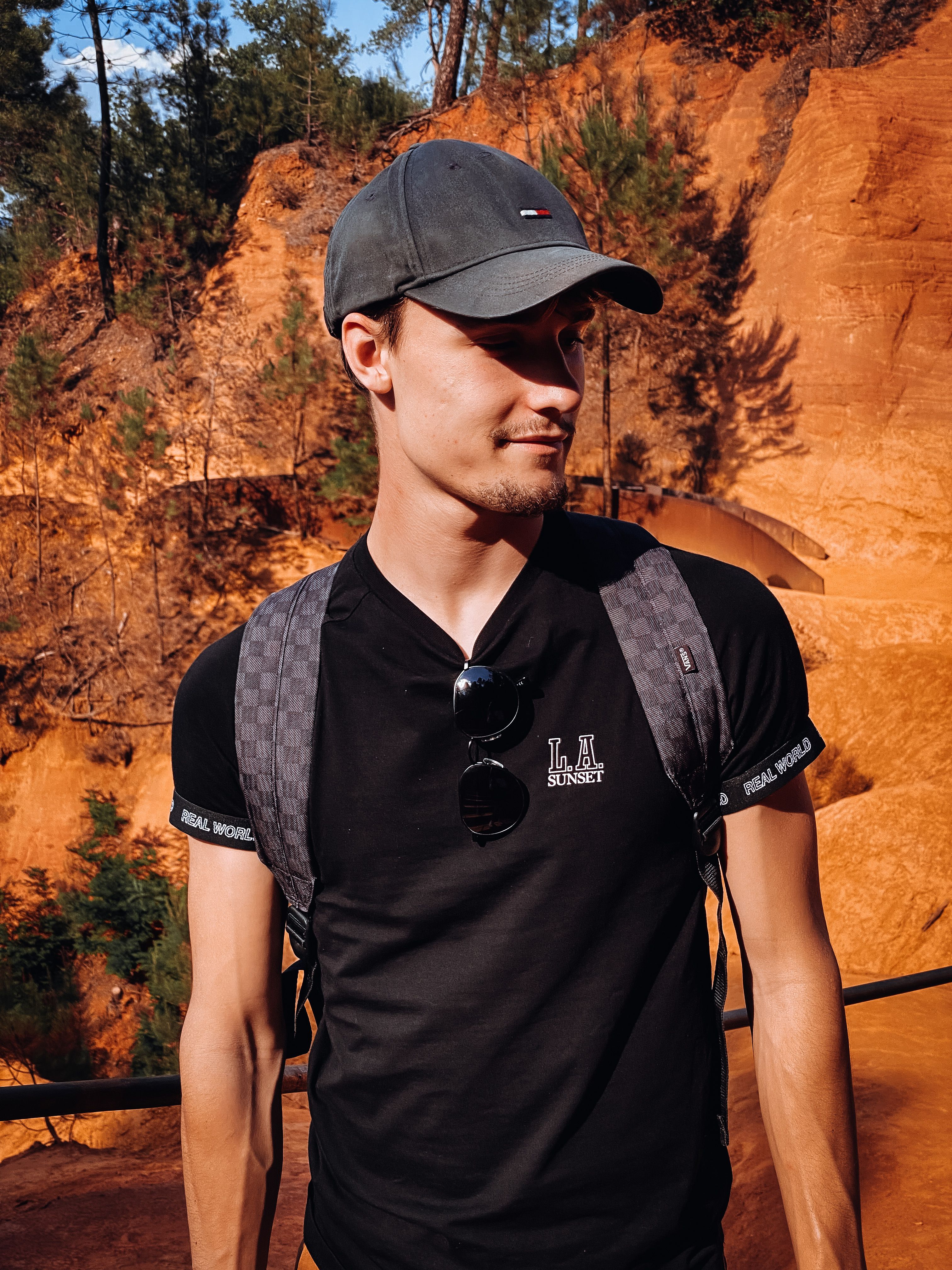 Man Wearing a Gray Cap and Black Shirt · Free Stock Photo
