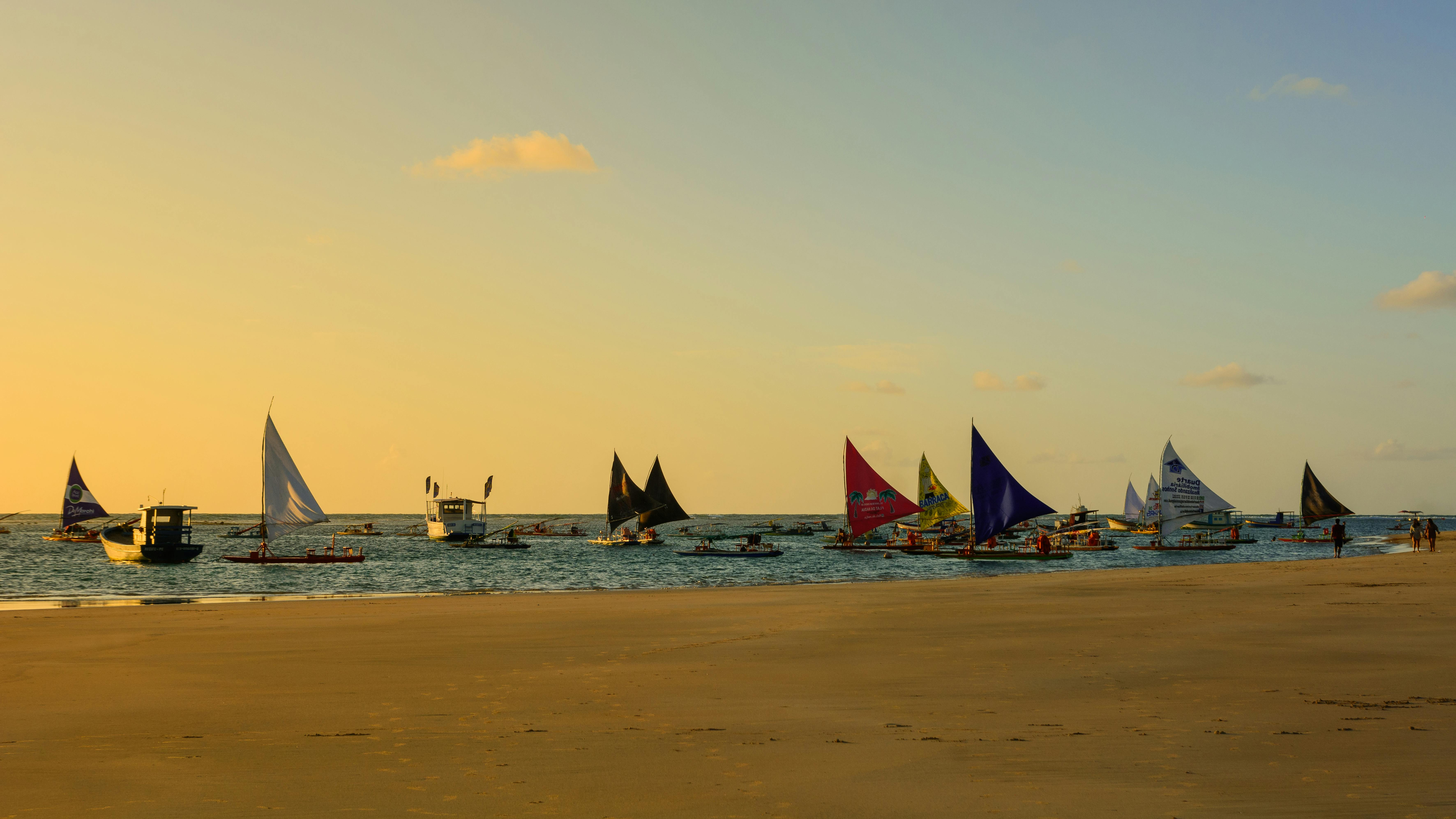 White Boat Sailing On Body Of Water · Free Stock Photo
