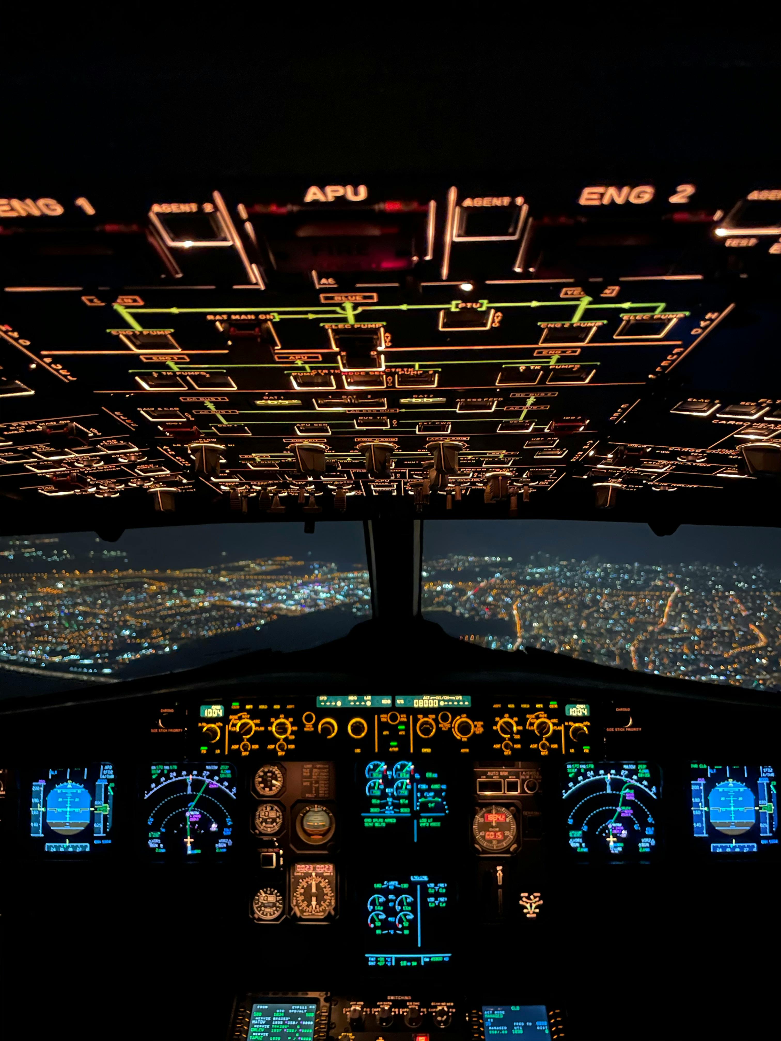Backlit Instrument Panel of an Airplane Cockpit · Free Stock Photo