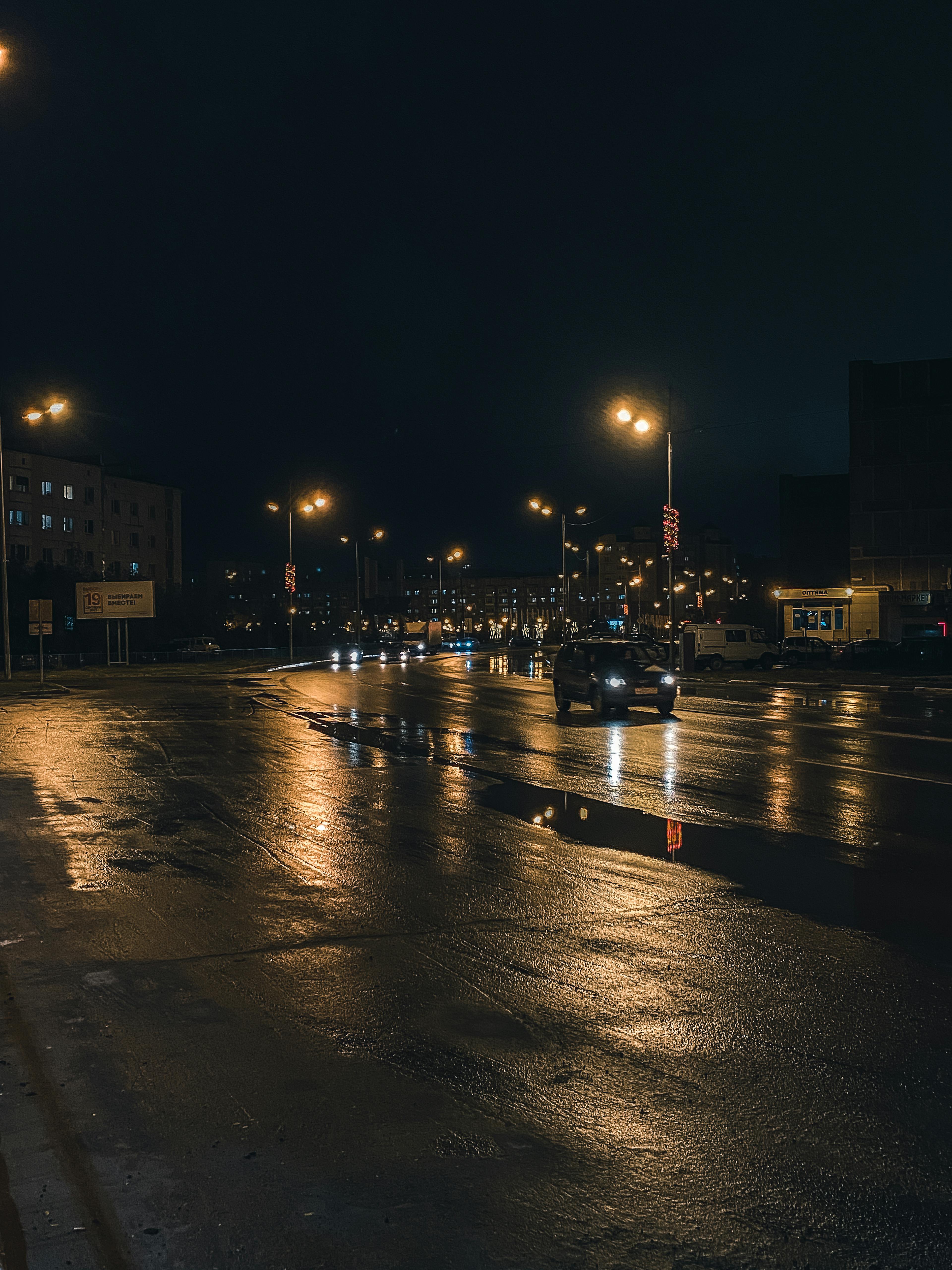 Cars with Lights on Driving Rainy Road at Night · Free Stock Photo