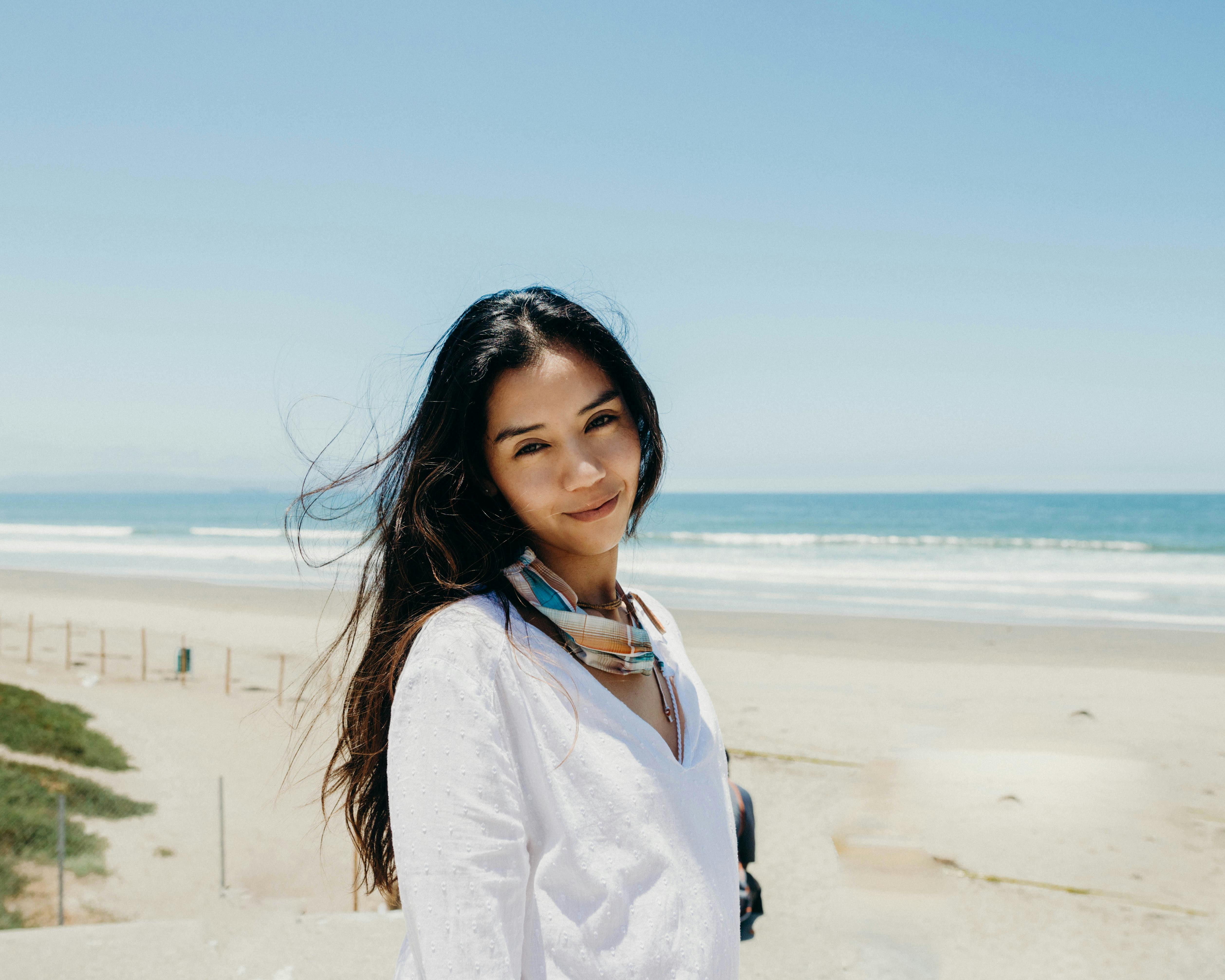 A Beautiful Woman at the Beach · Free Stock Photo