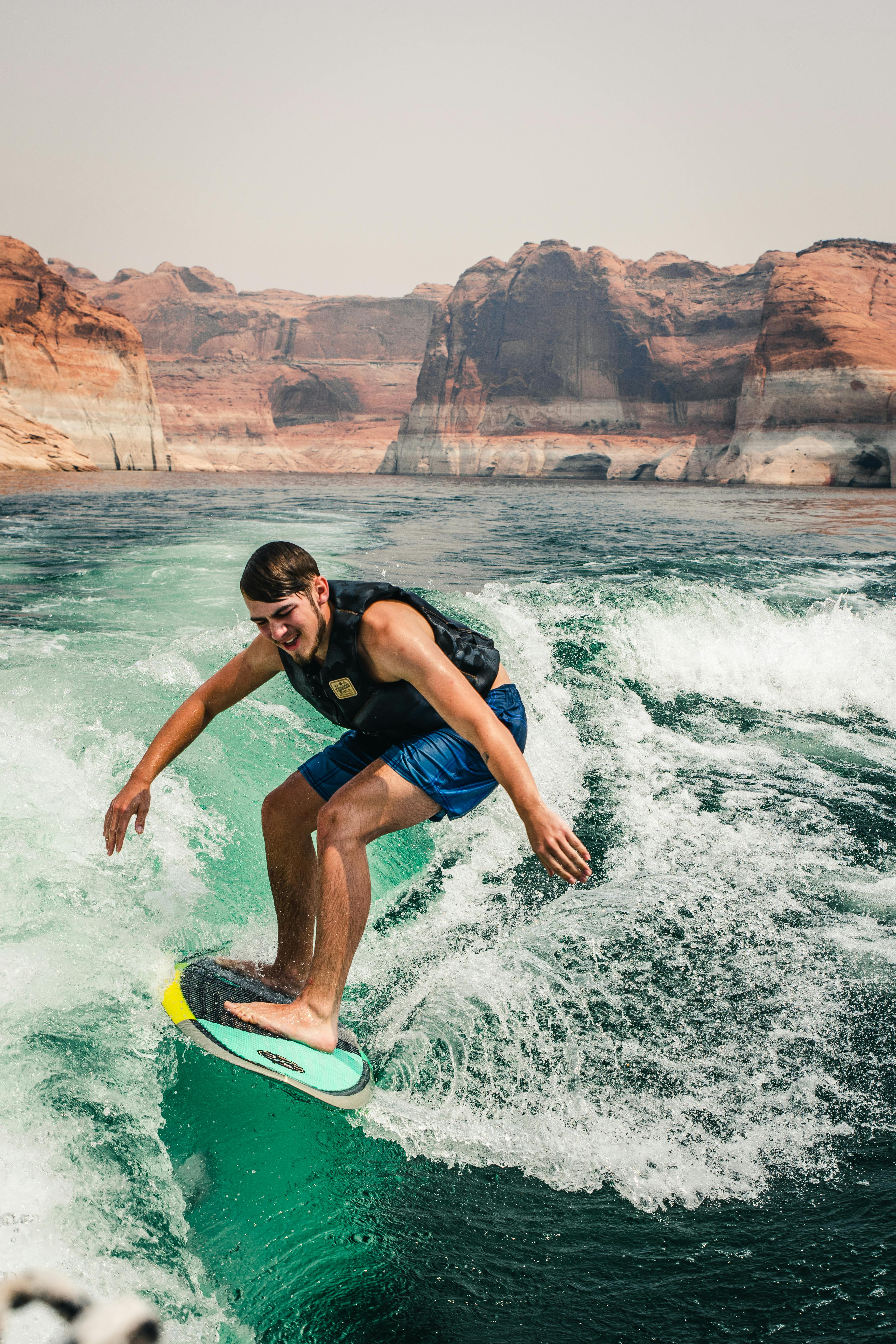 Man Riding Waves Photos, Download The BEST Free Man Riding Waves Stock ...