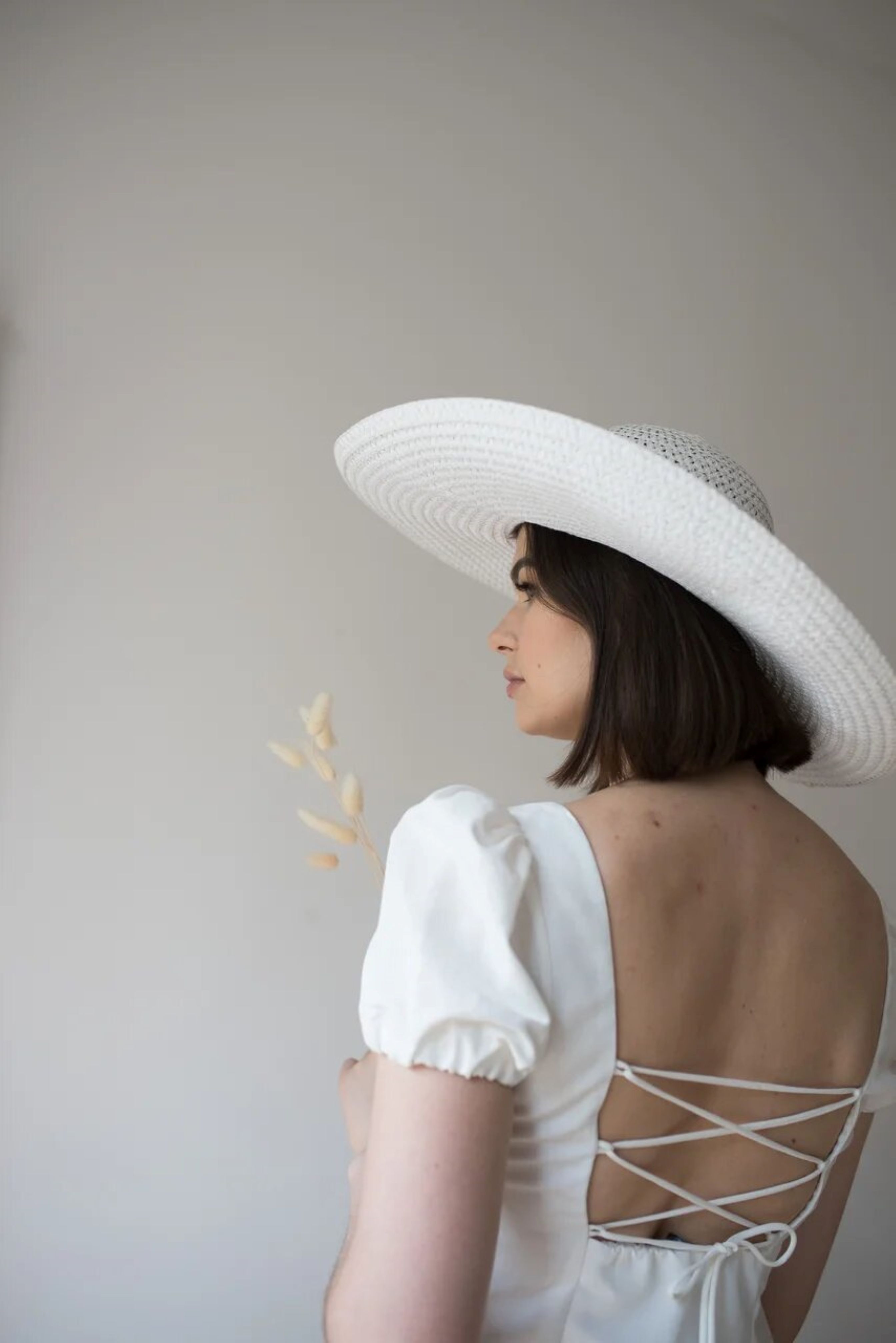 A Woman Wearing White Hat · Free Stock Photo