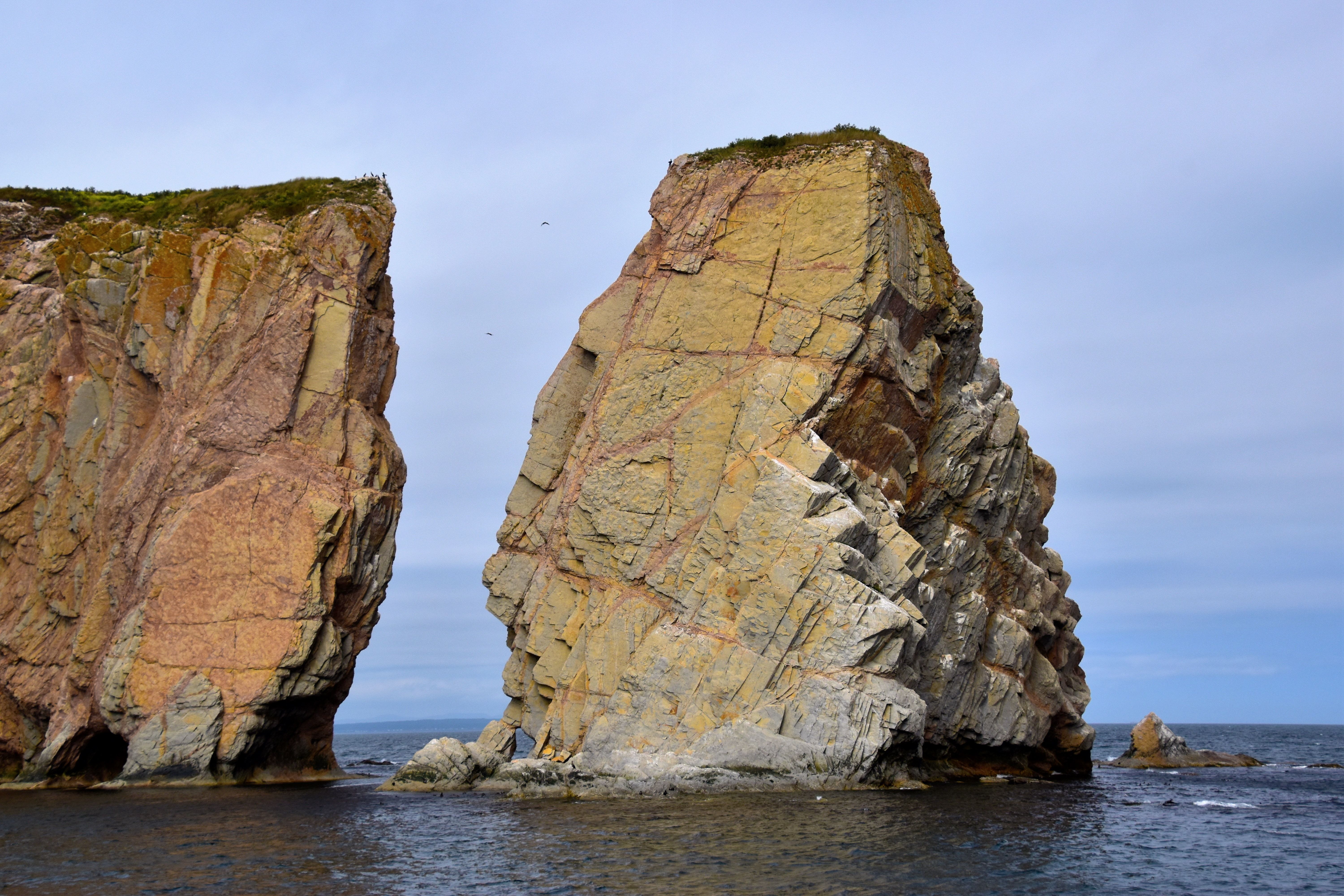 Rock Formations on Sea Shore · Free Stock Photo