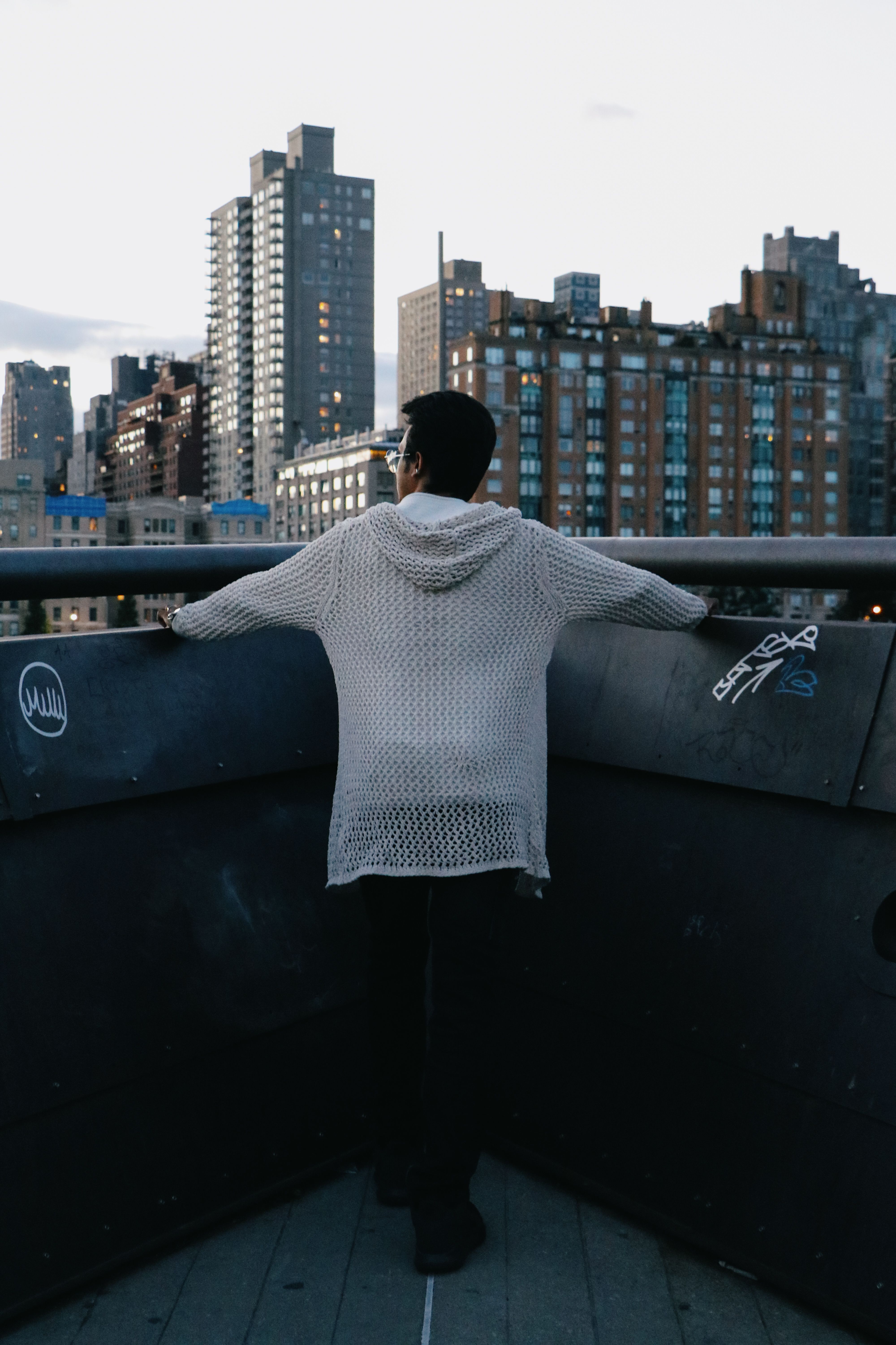 Back View of a Man Looking at Buildings · Free Stock Photo