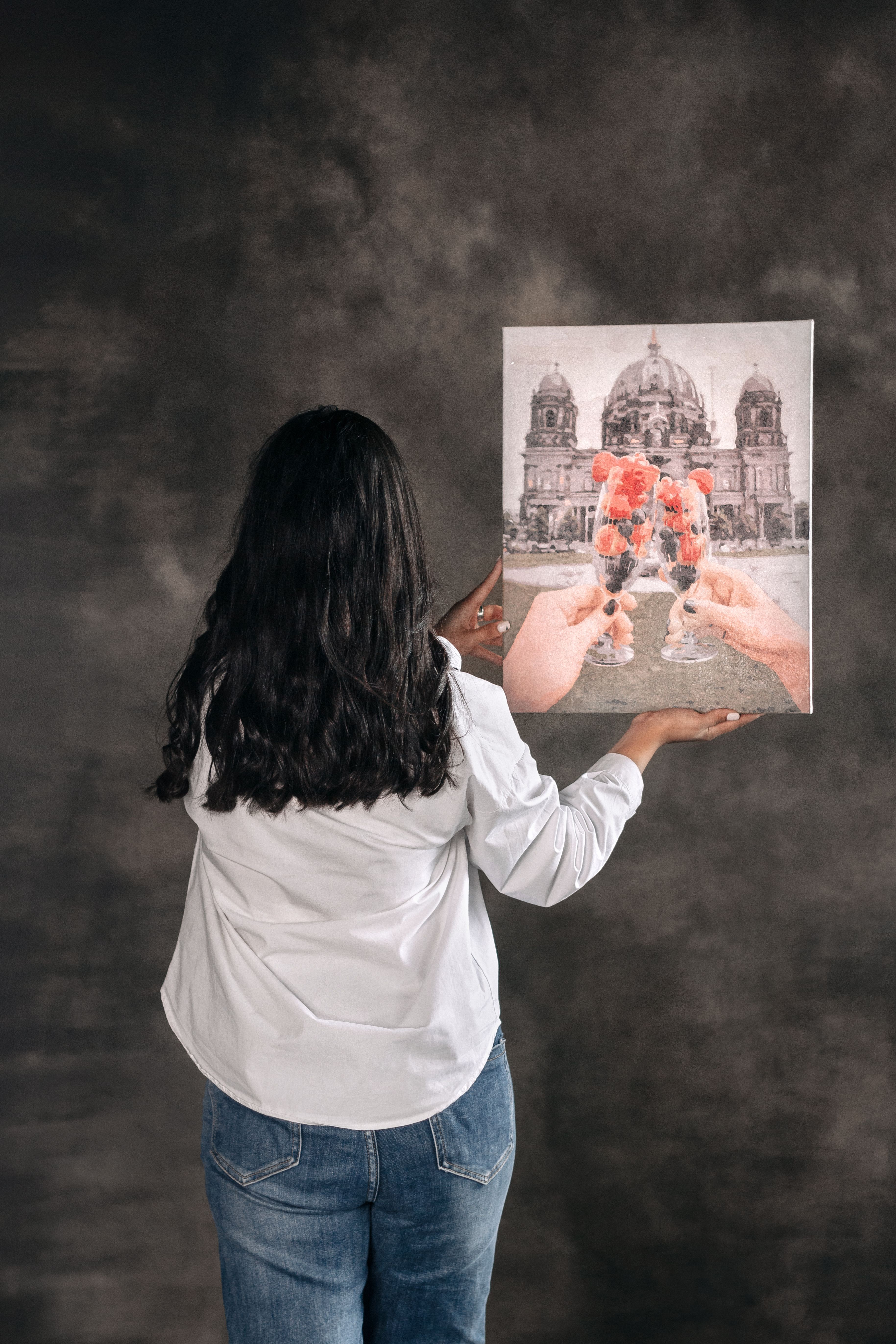 A Woman Holding a Painting · Free Stock Photo