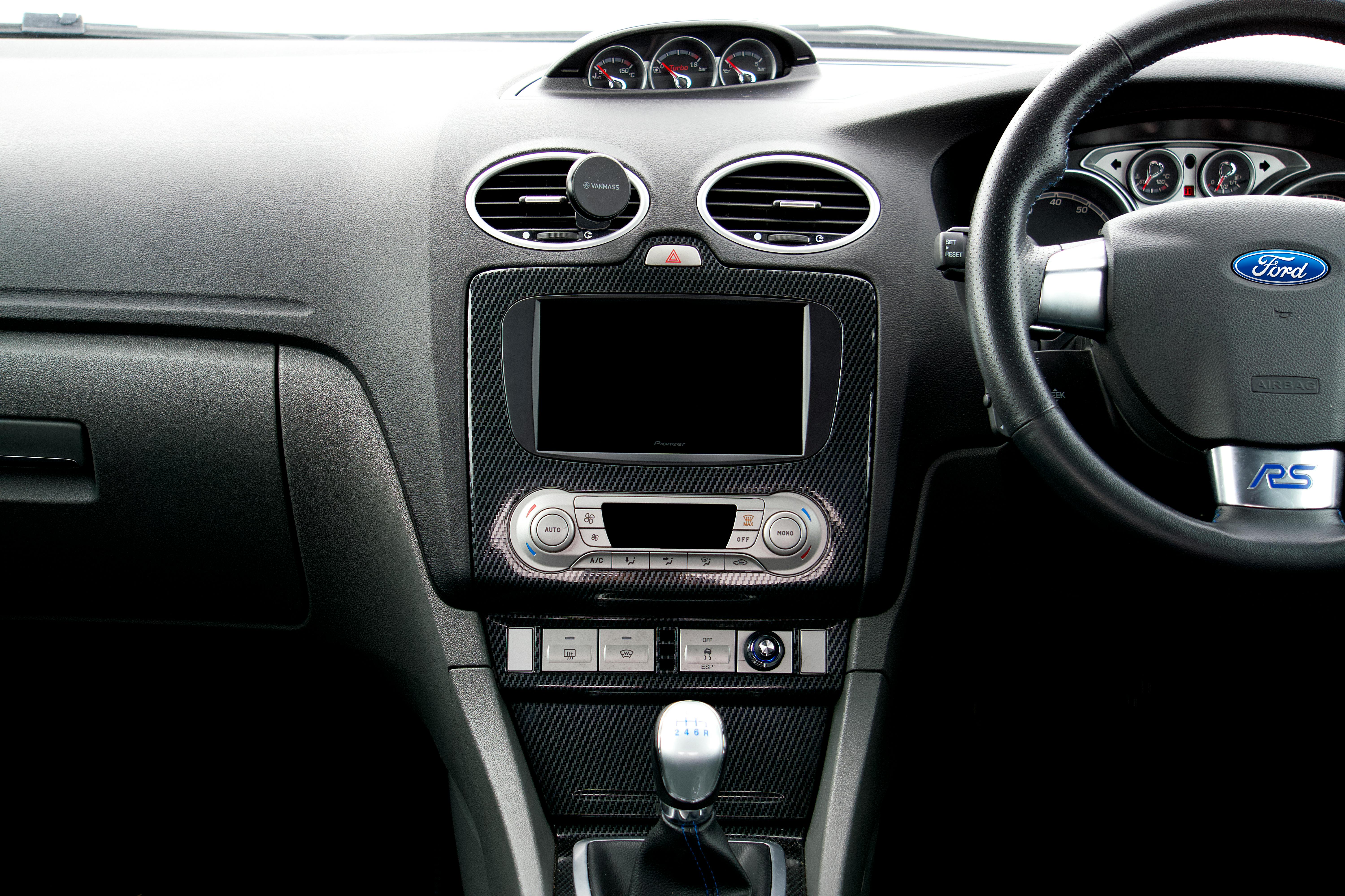 Black Dashboard and Steering Wheel of a Car · Free Stock Photo
