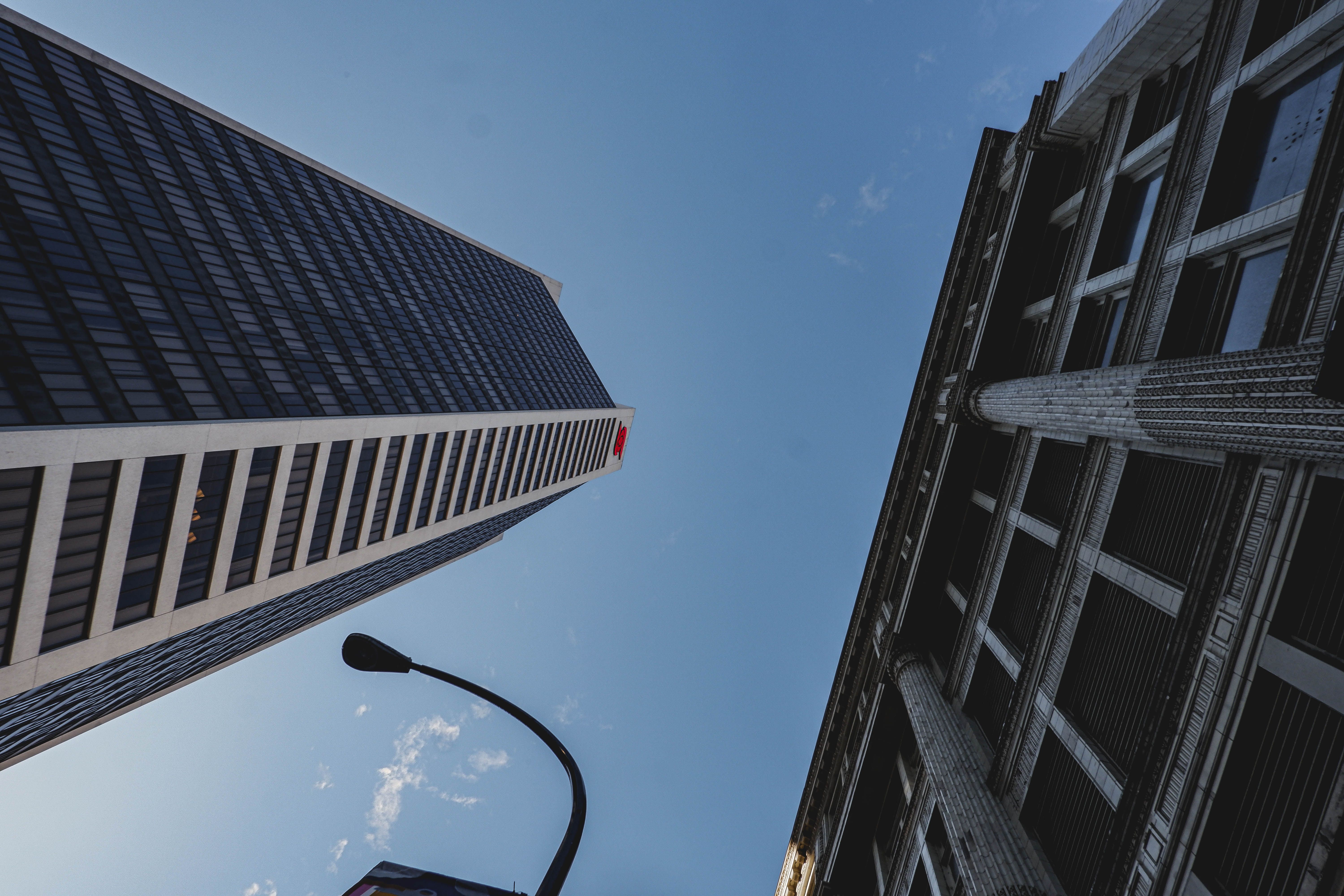 High Rise Buildings Under a Clear Blue Sky · Free Stock Photo