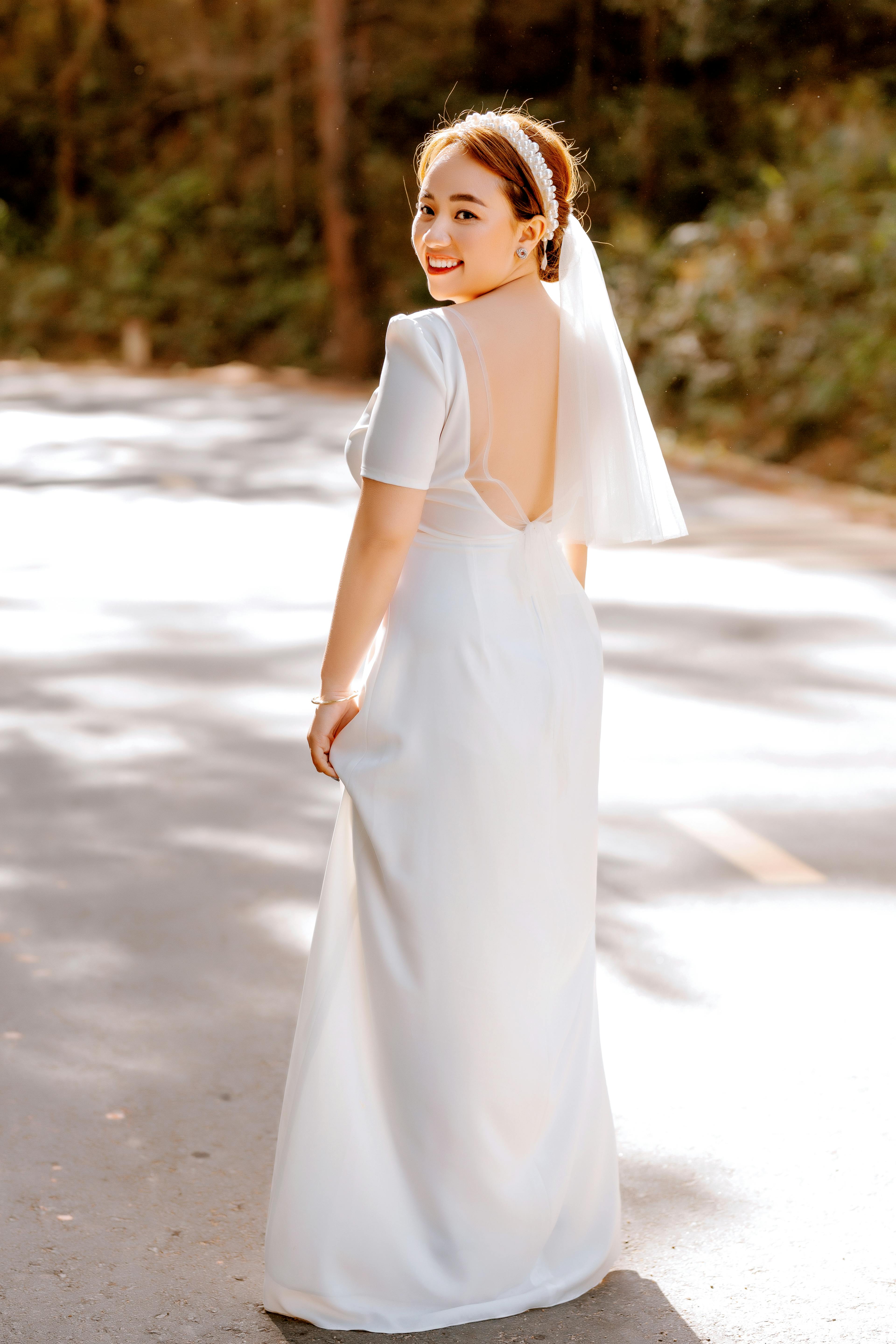 A Bride Looking Over Her Shoulder · Free Stock Photo