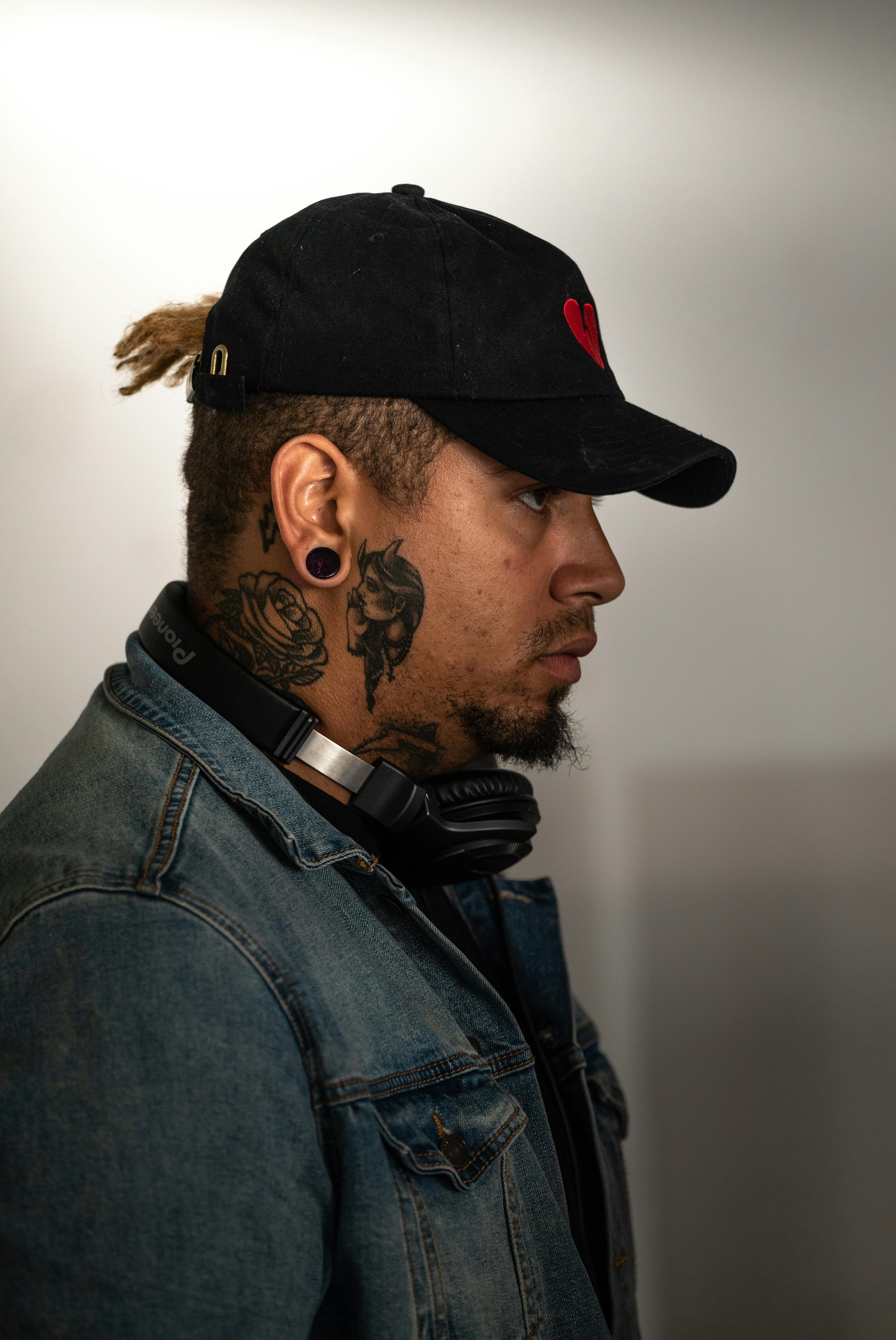 Man Wearing a Denim Jacket · Free Stock Photo