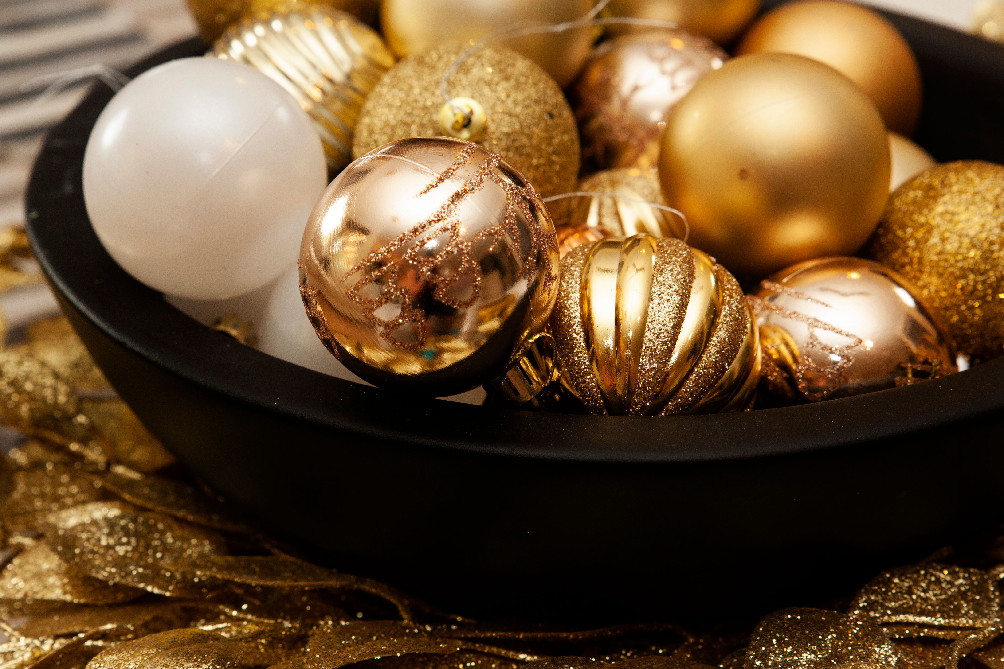 Gold Christmas Balls in a Black Bowl · Free Stock Photo
