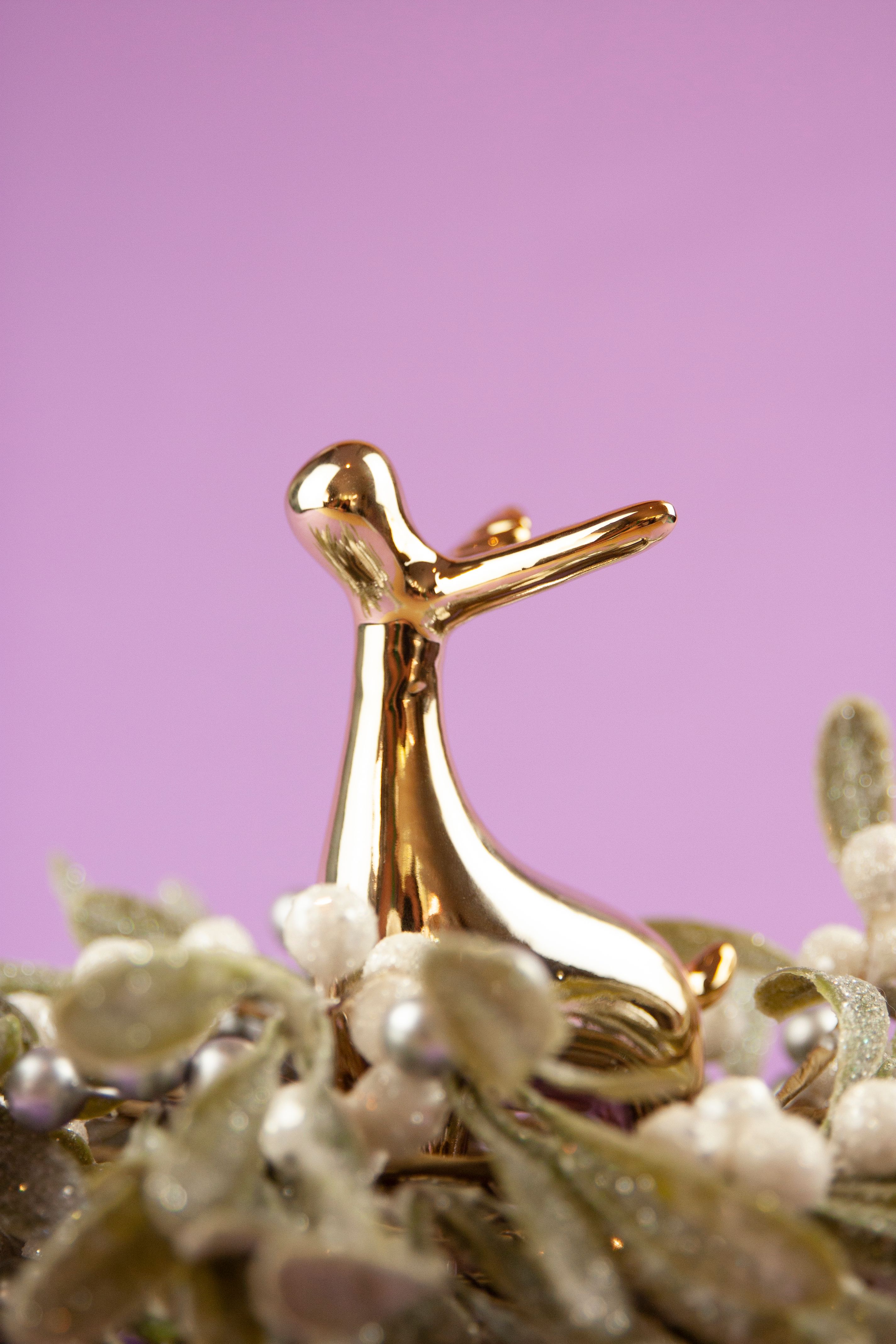 Close-Up Shot of a Ceramic Figurine · Free Stock Photo
