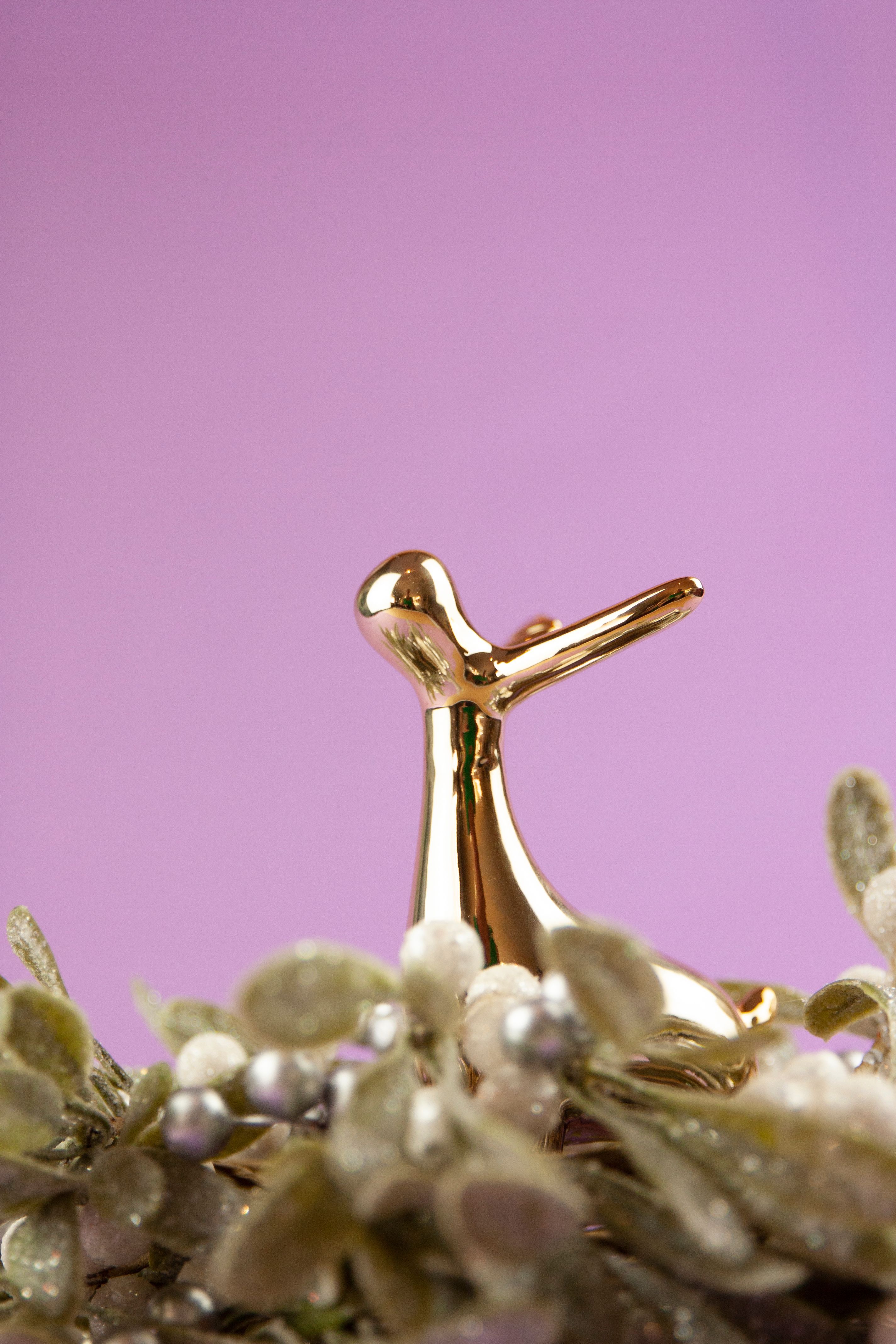 Close up of a Golden Figurine · Free Stock Photo