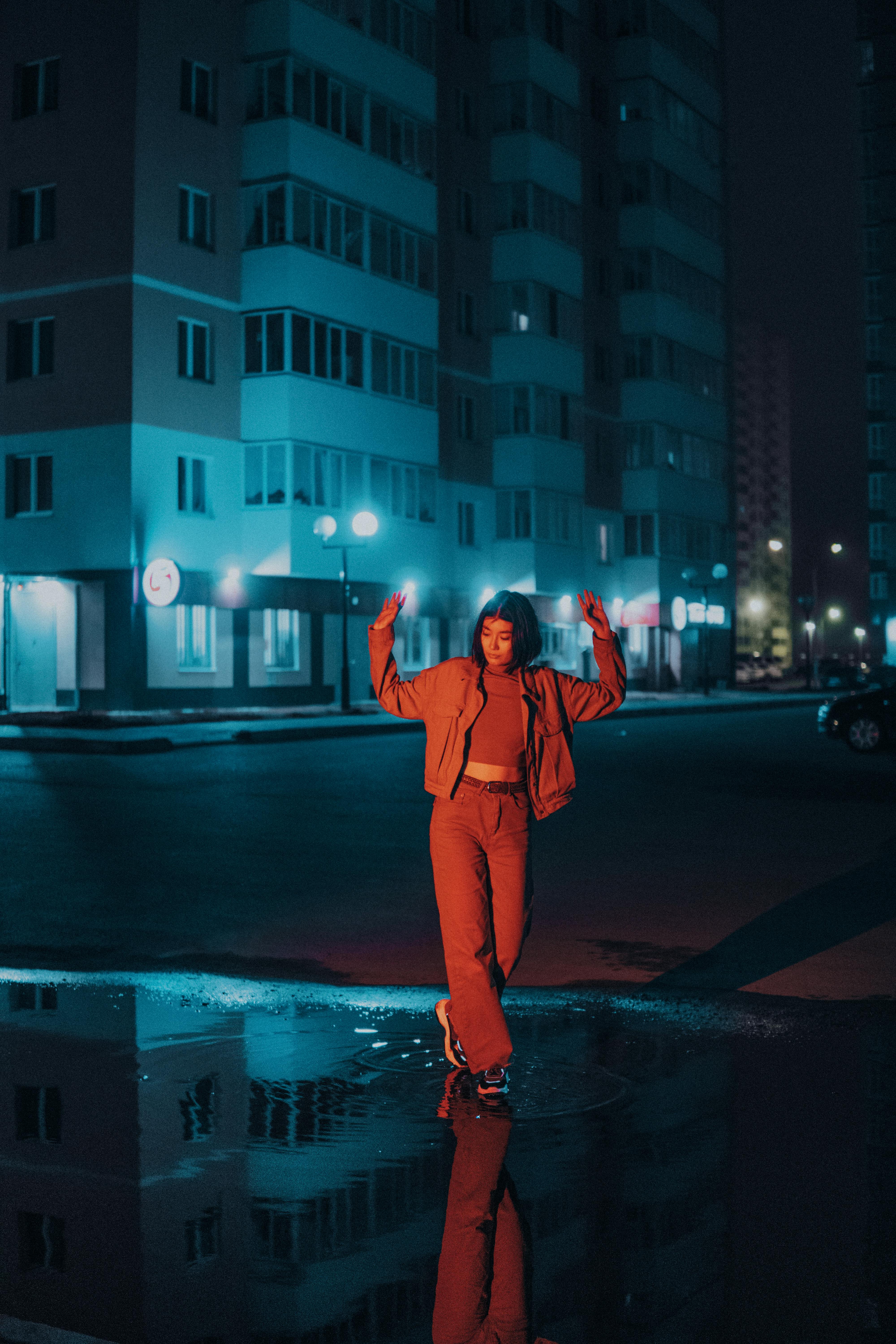 Woman Walking on Road at Night · Free Stock Photo