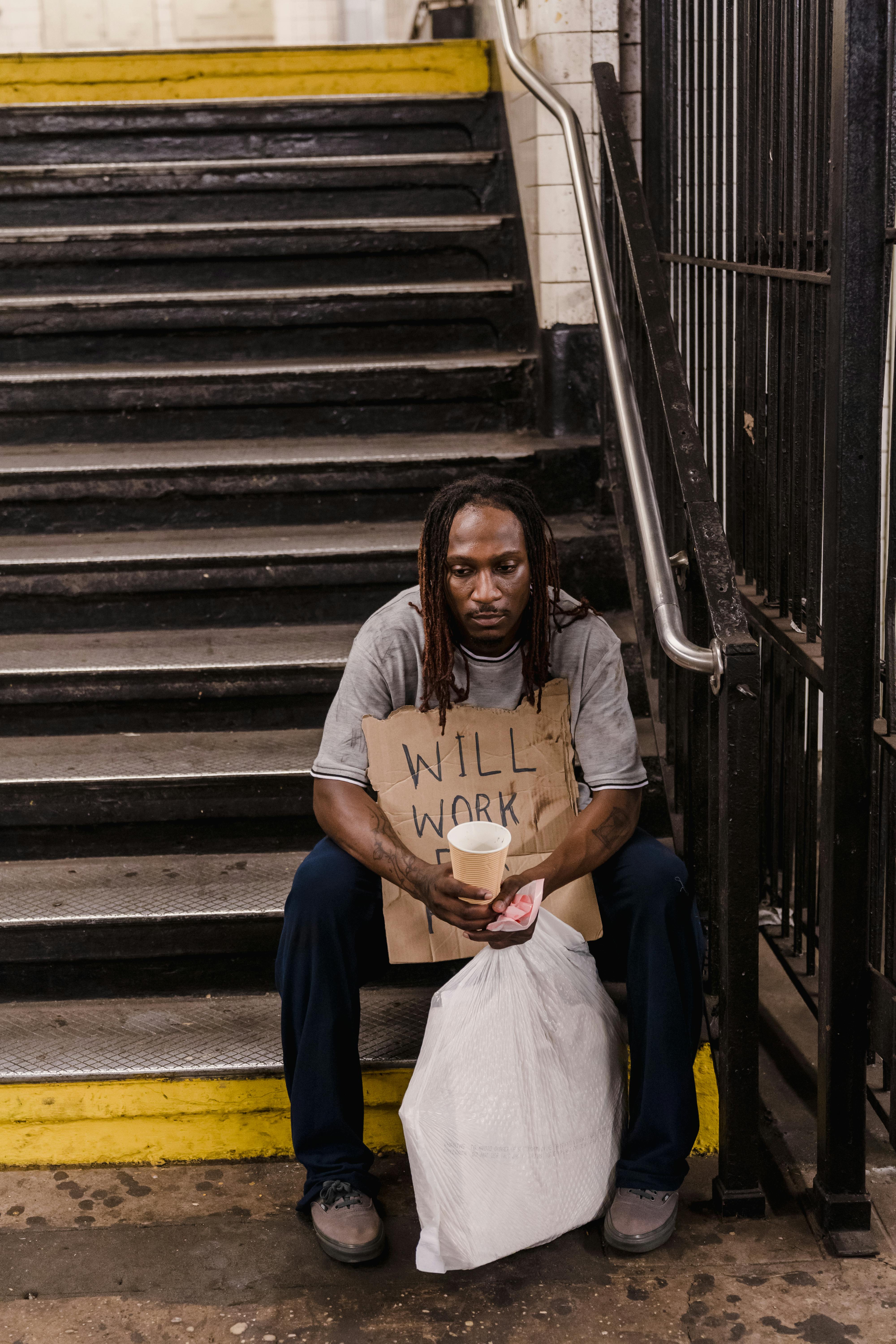 Sad Jobless Man Sitting on Stairs · Free Stock Photo