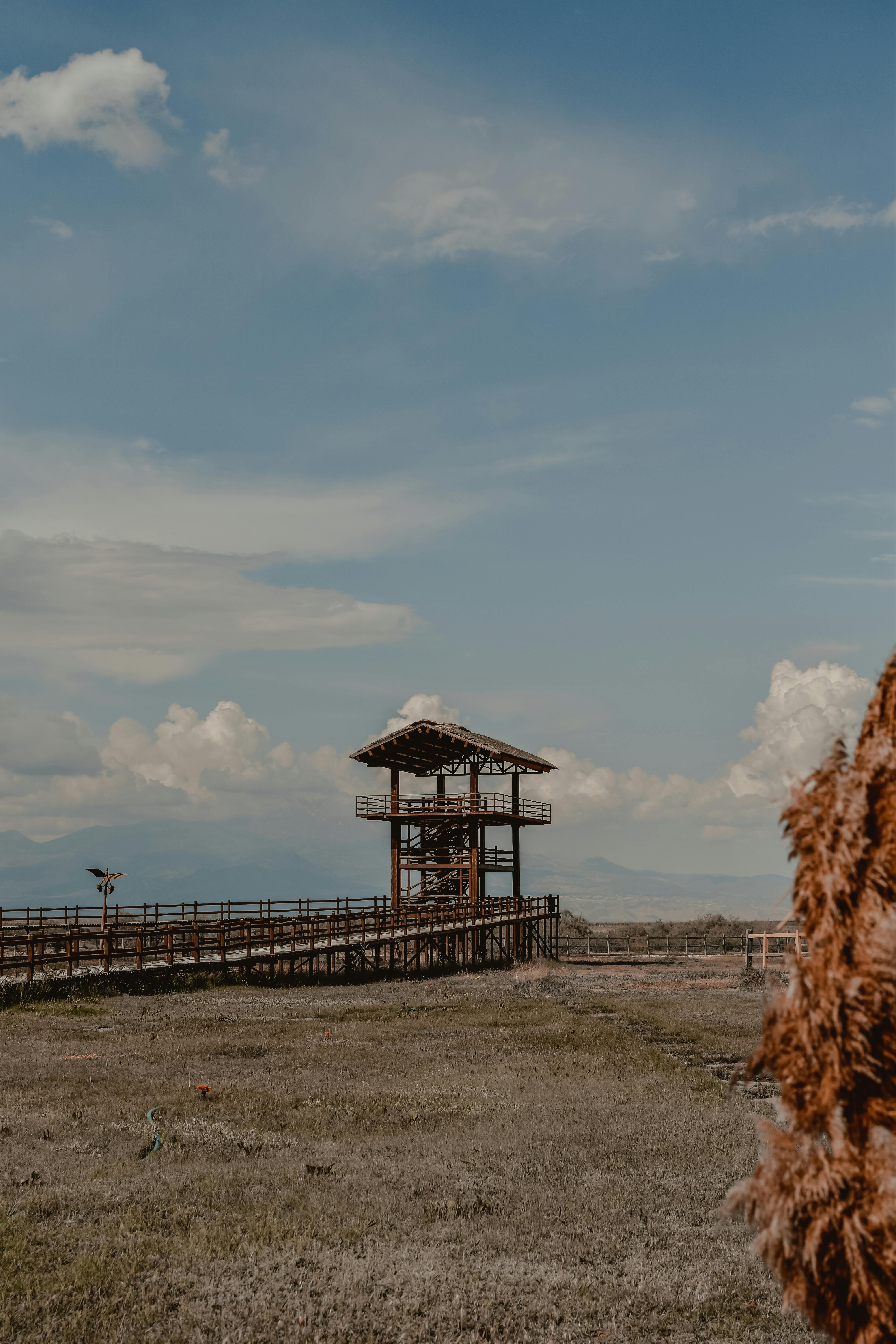 Wooden Tower in Plain · Free Stock Photo