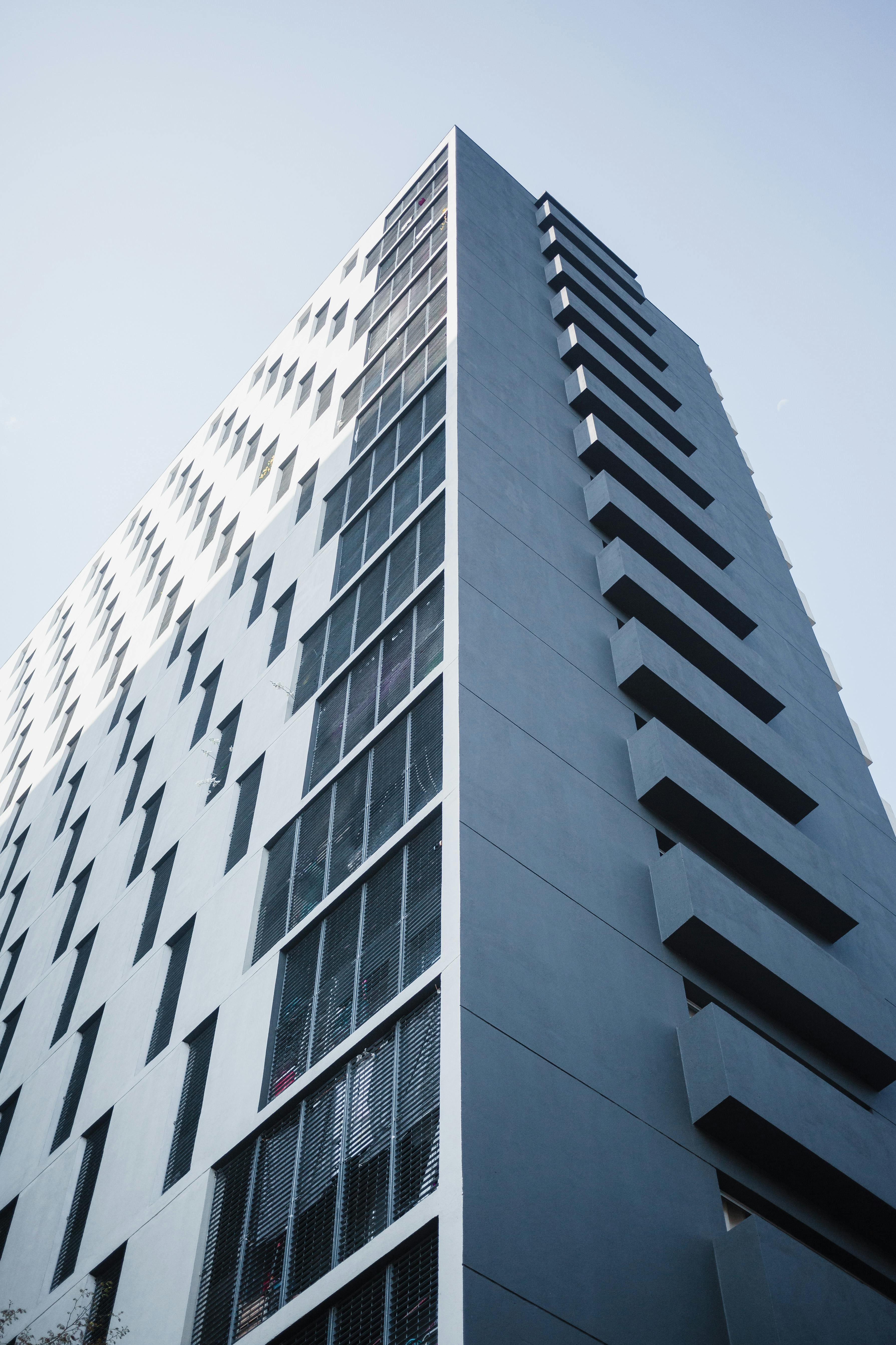 Reflection of High-rise Buildings on Water Surface · Free Stock Photo