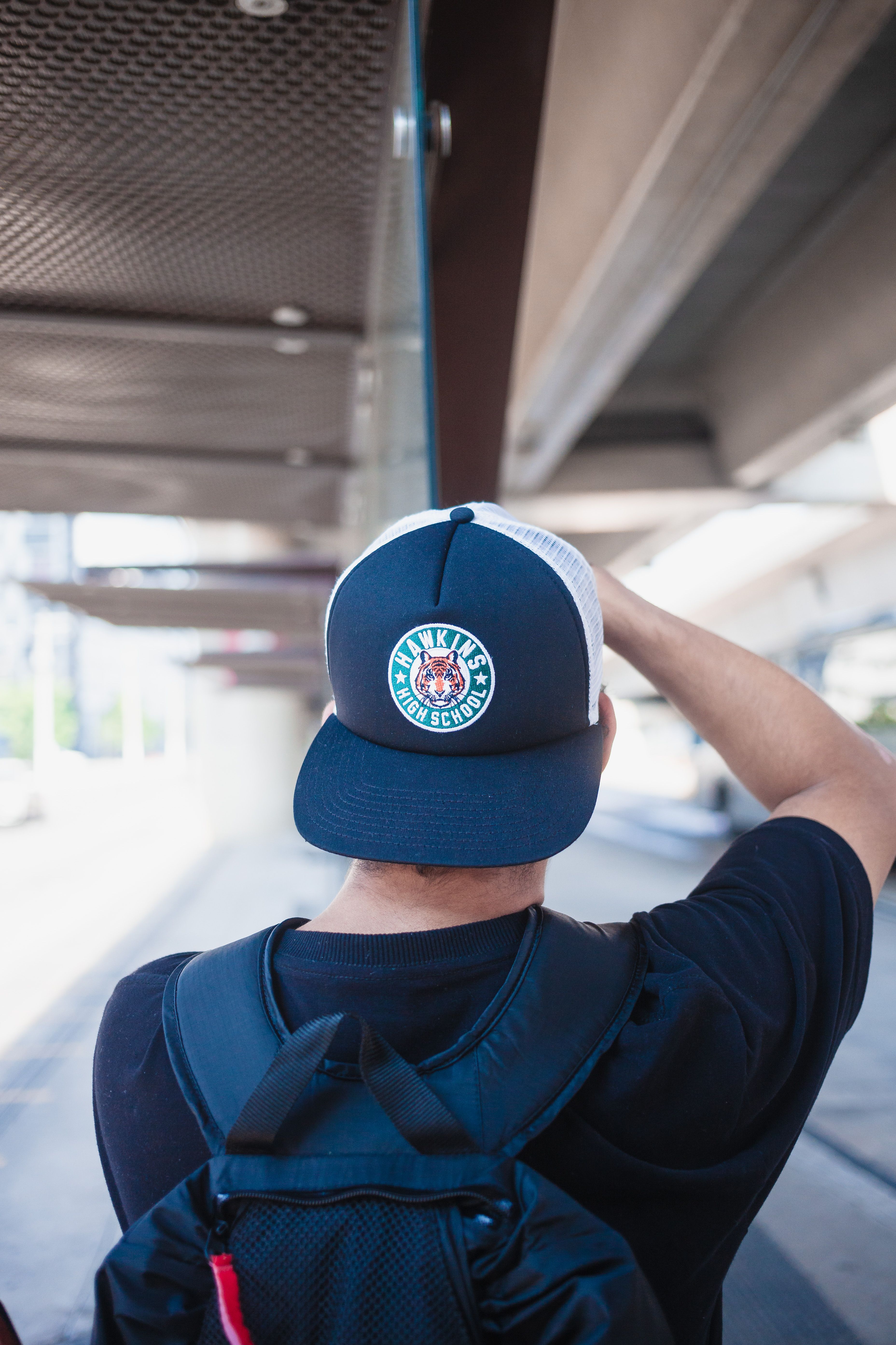 Back View of a Man Wearing a Black and White Cap · Free Stock Photo