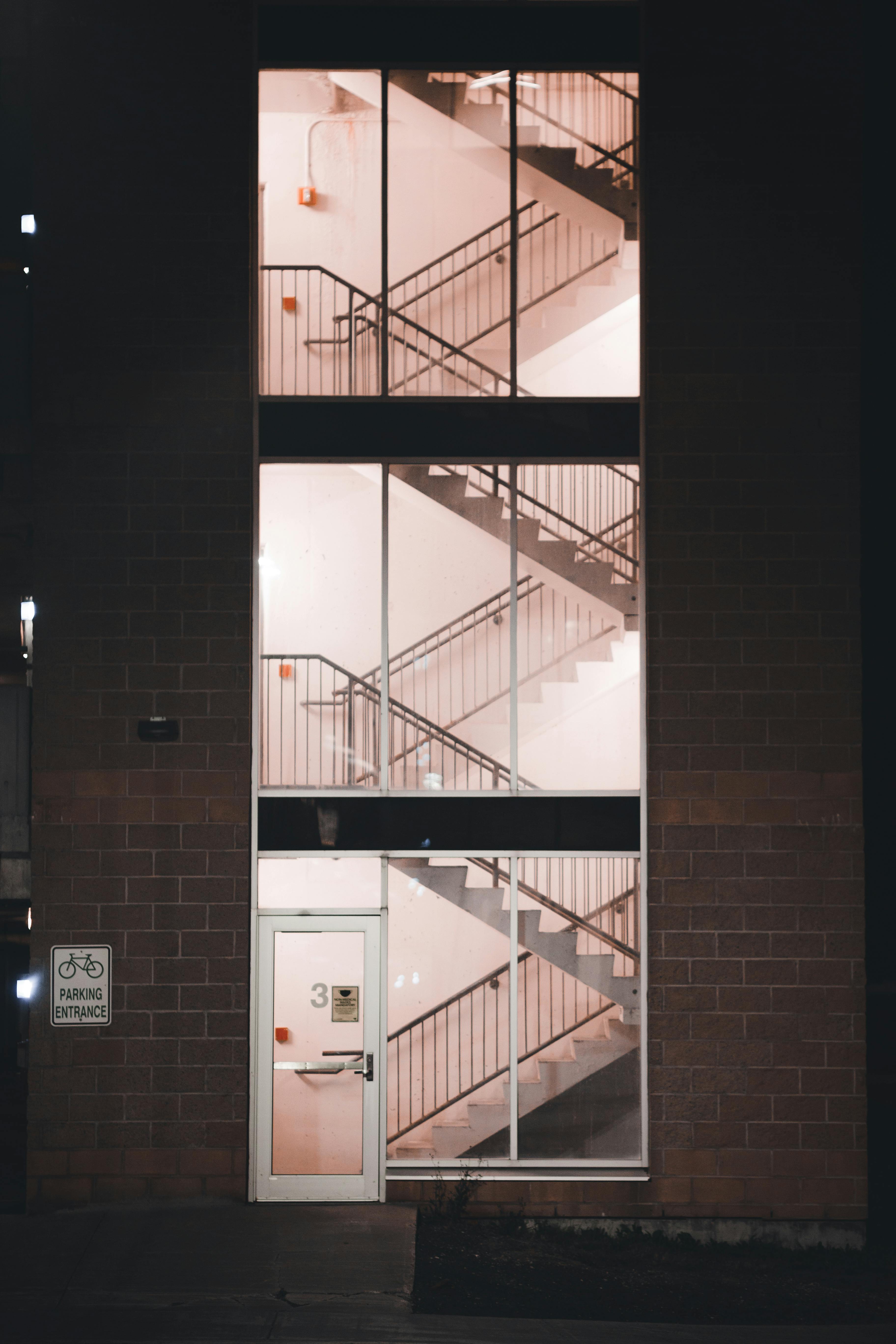 Staircase in a Building Visible Through the Windows · Free Stock Photo