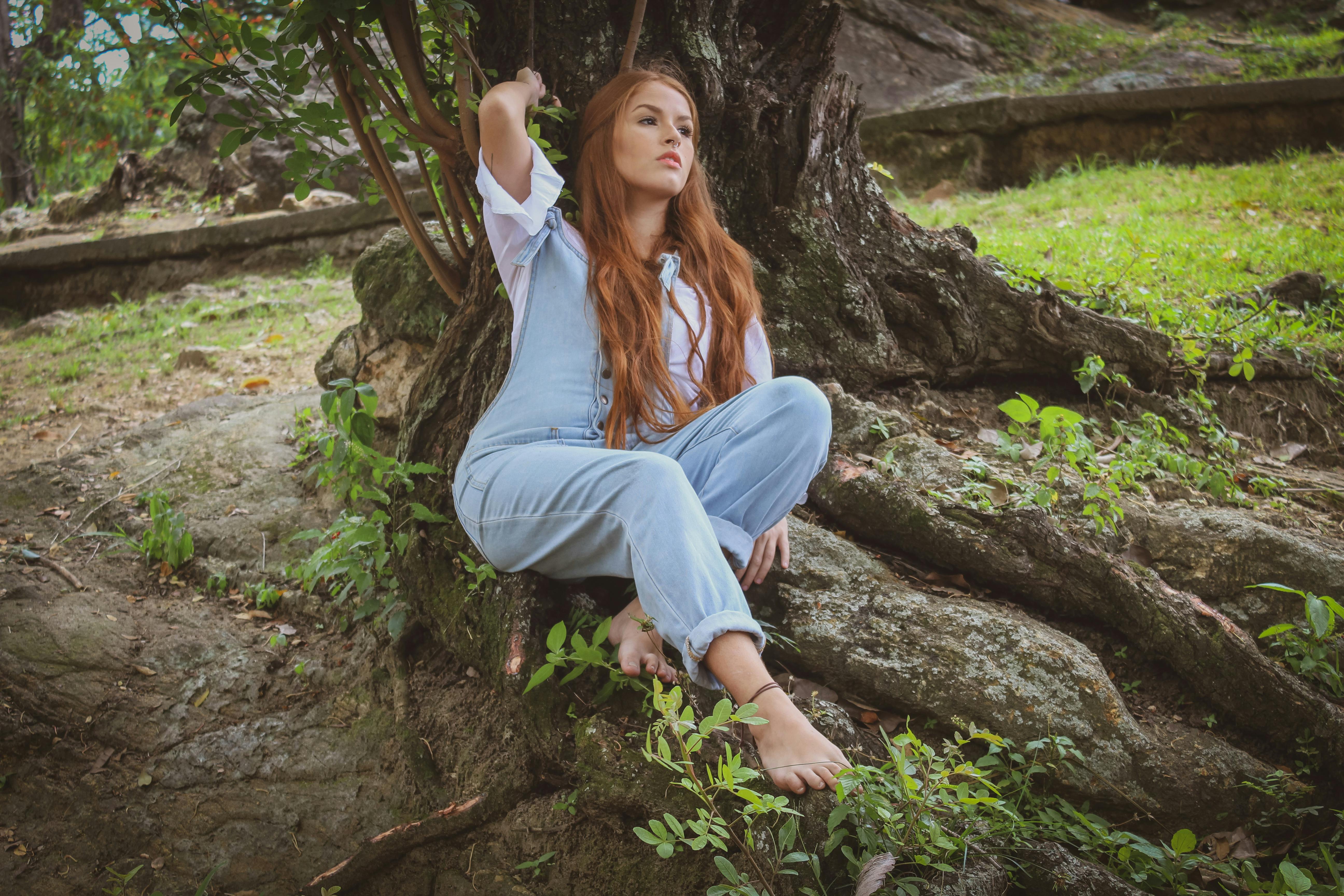 Woman Sitting on Tree · Free Stock Photo