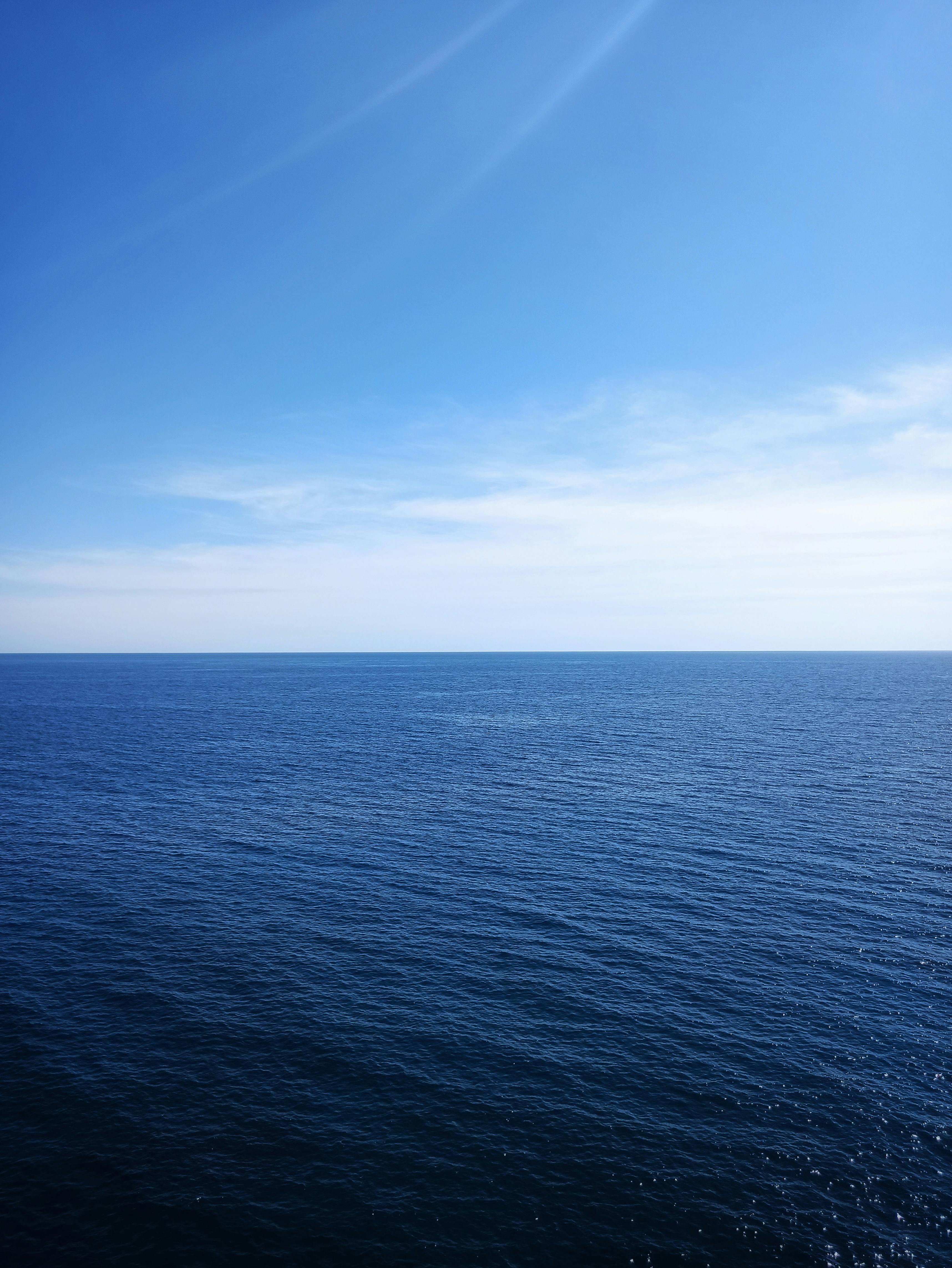 Blue Ocean Under Blue Sky · Free Stock Photo