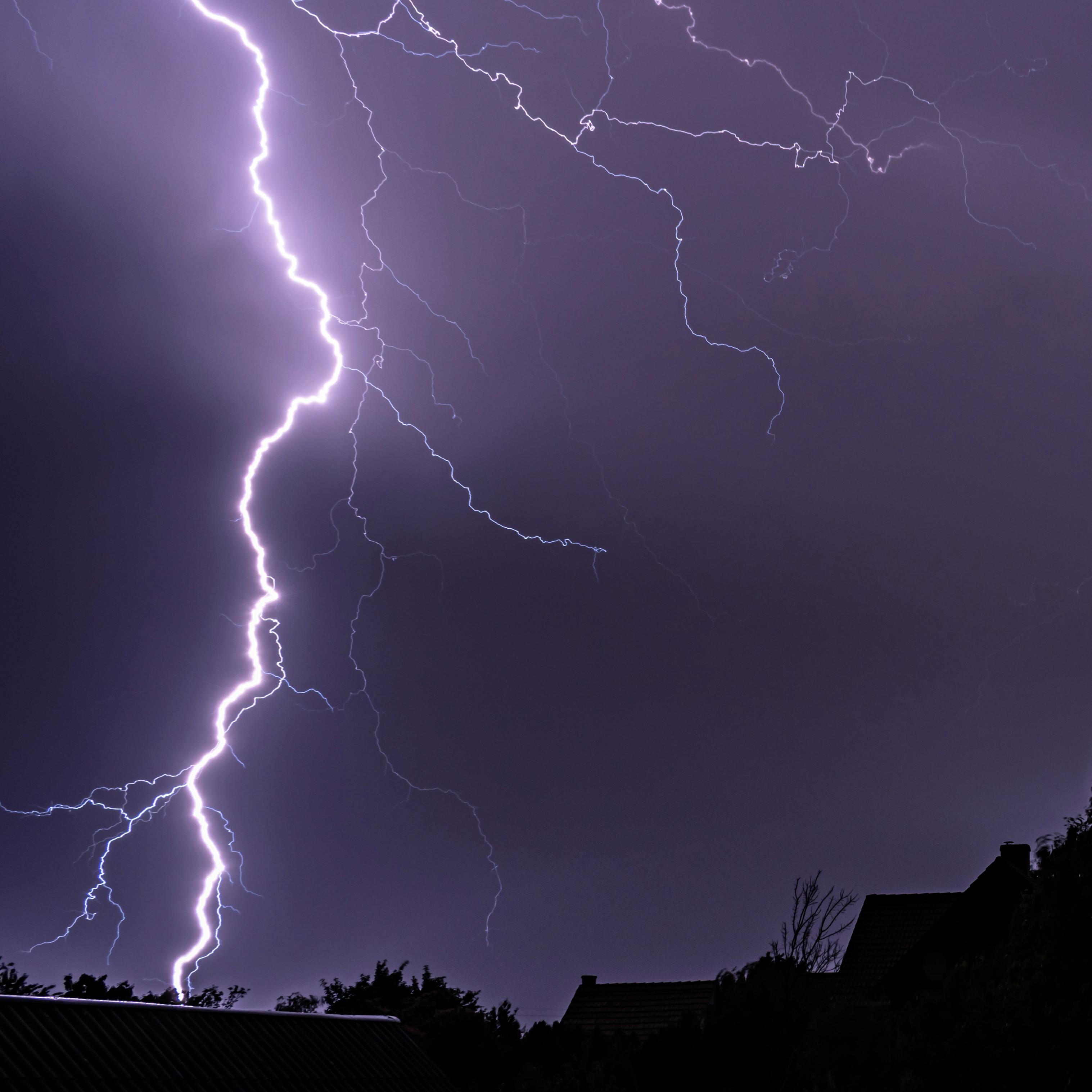 Lighting Strike on the Cloudy Night Sky · Free Stock Photo