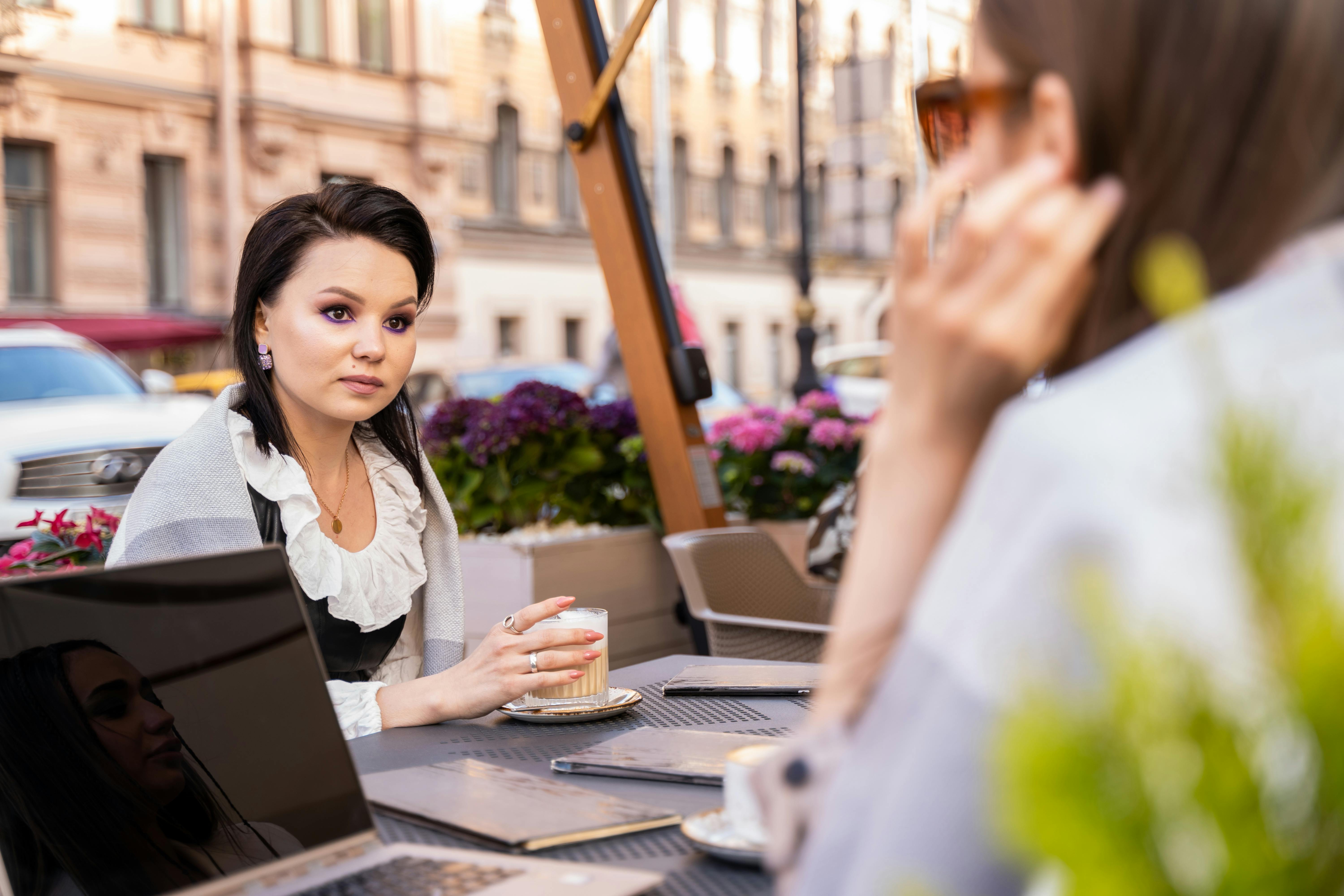 Woman sitting beside the Table · Free Stock Photo