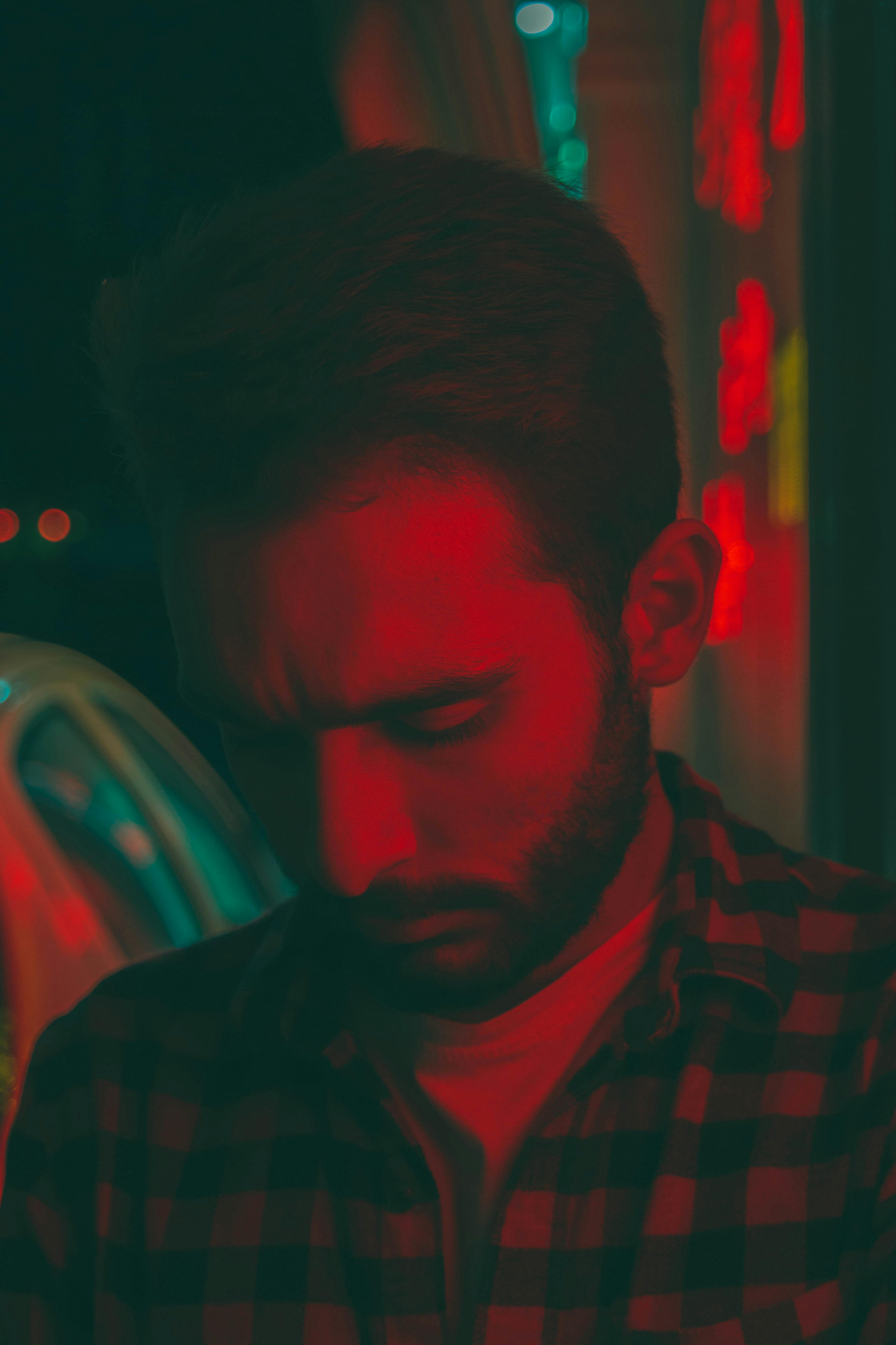 A Mans Face with a Red Light · Free Stock Photo
