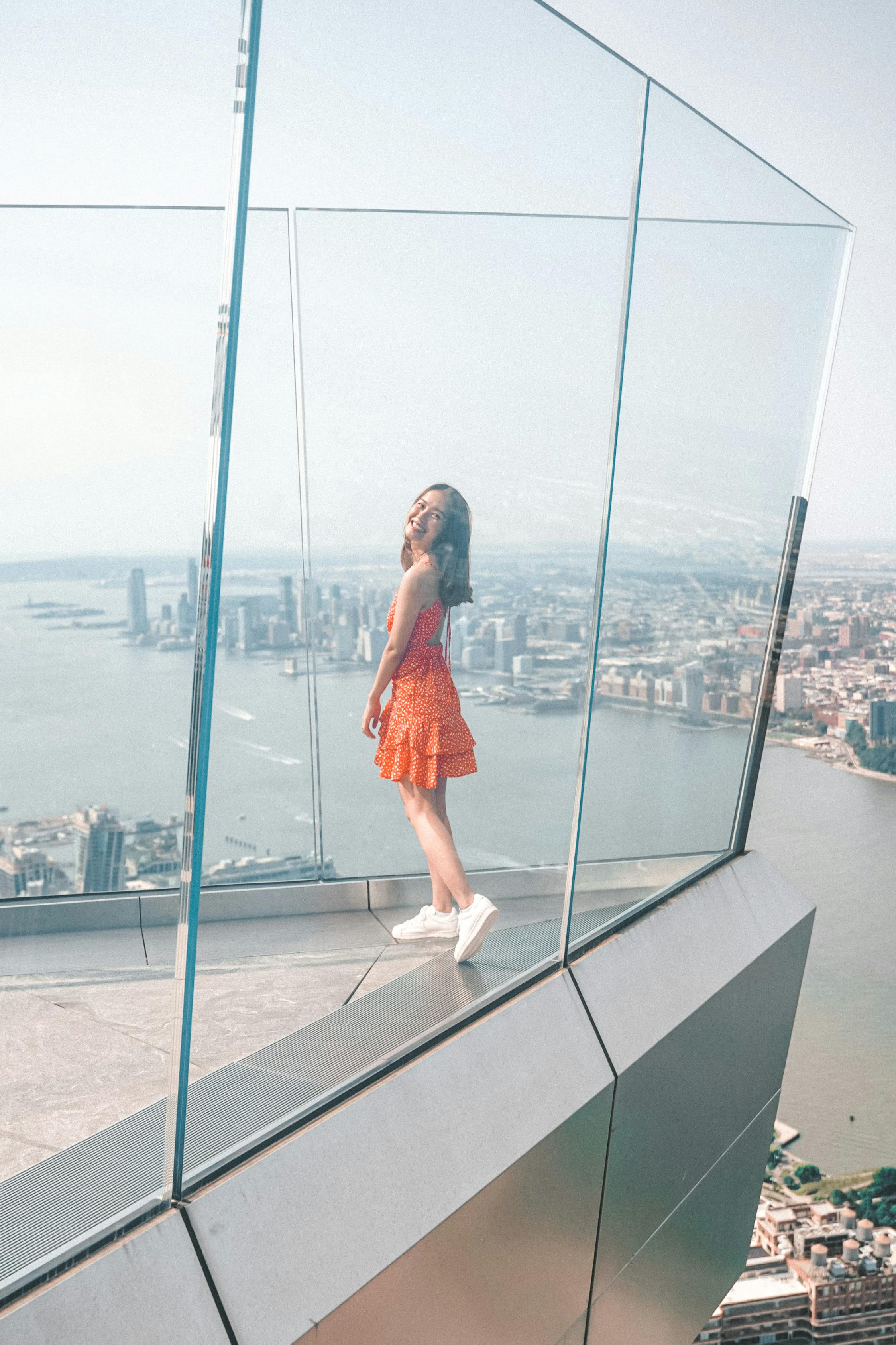 Silhouette of a Woman Standing Behind Glass Panel · Free Stock Photo