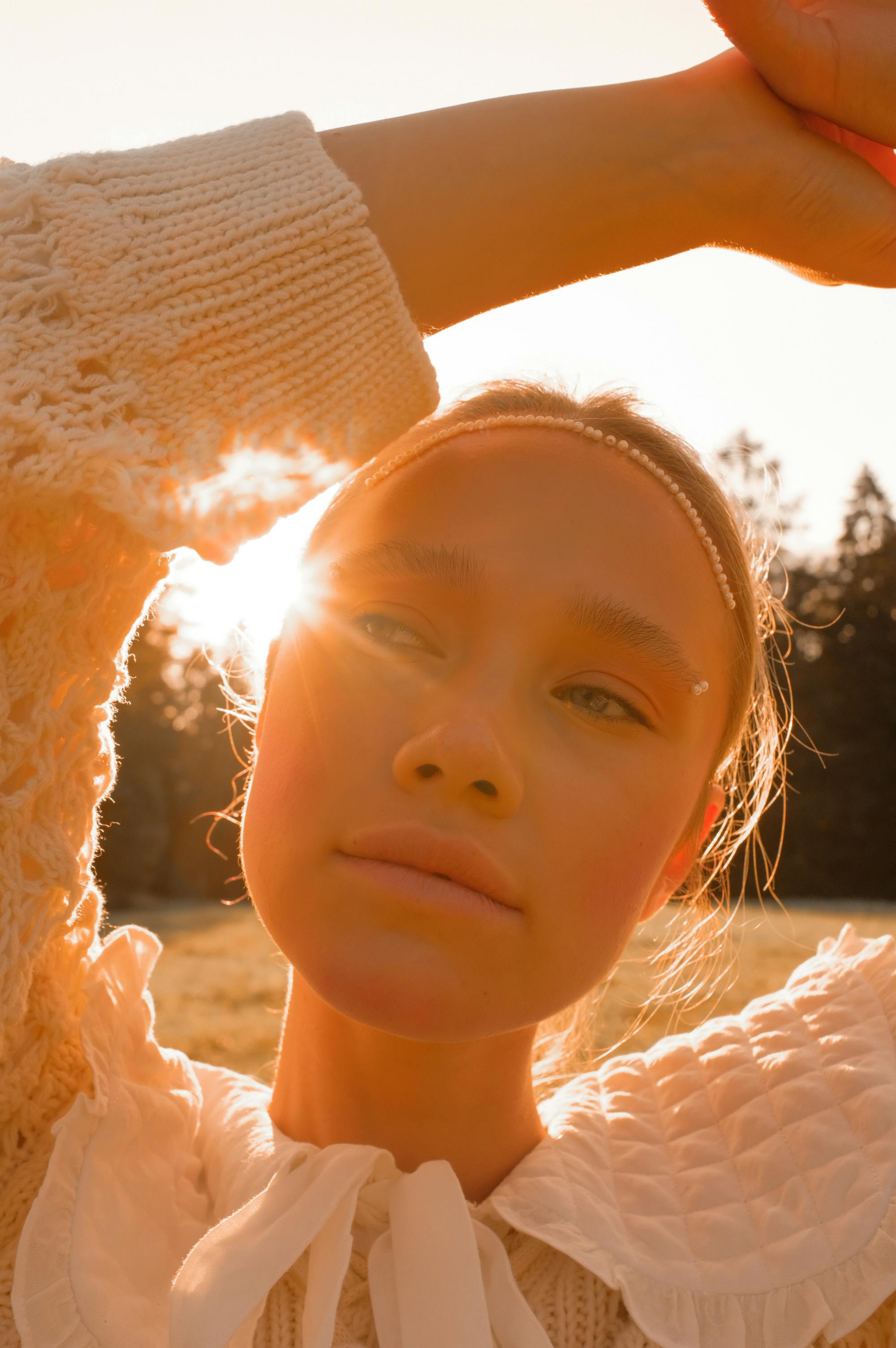 Slender woman dancing near window in bright sunshine · Free Stock Photo