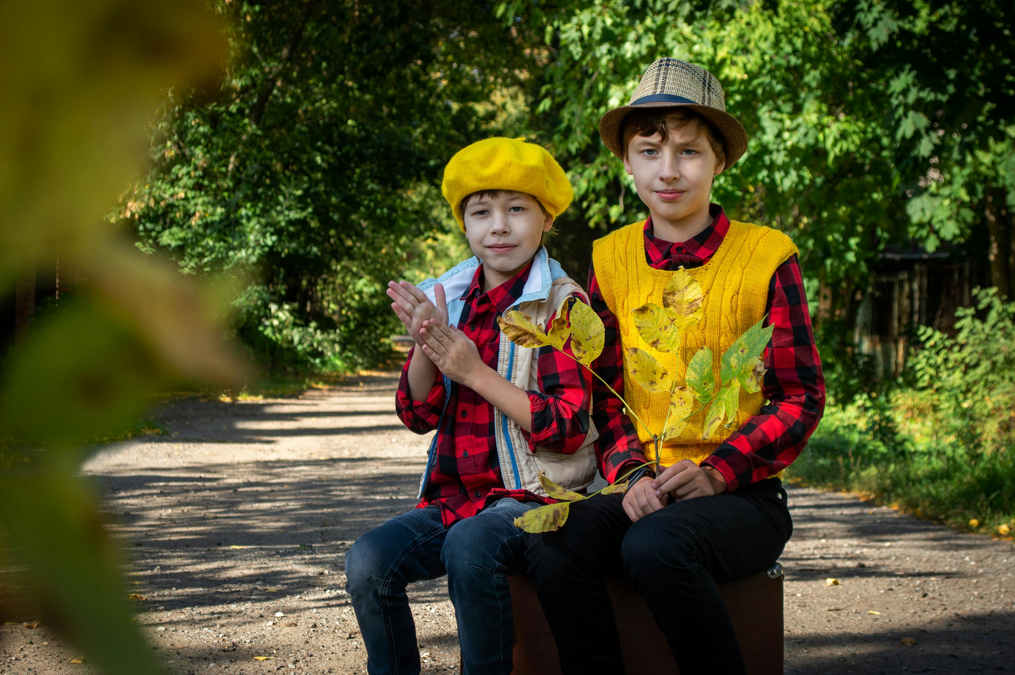 Children seated beside each other · Free Stock Photo